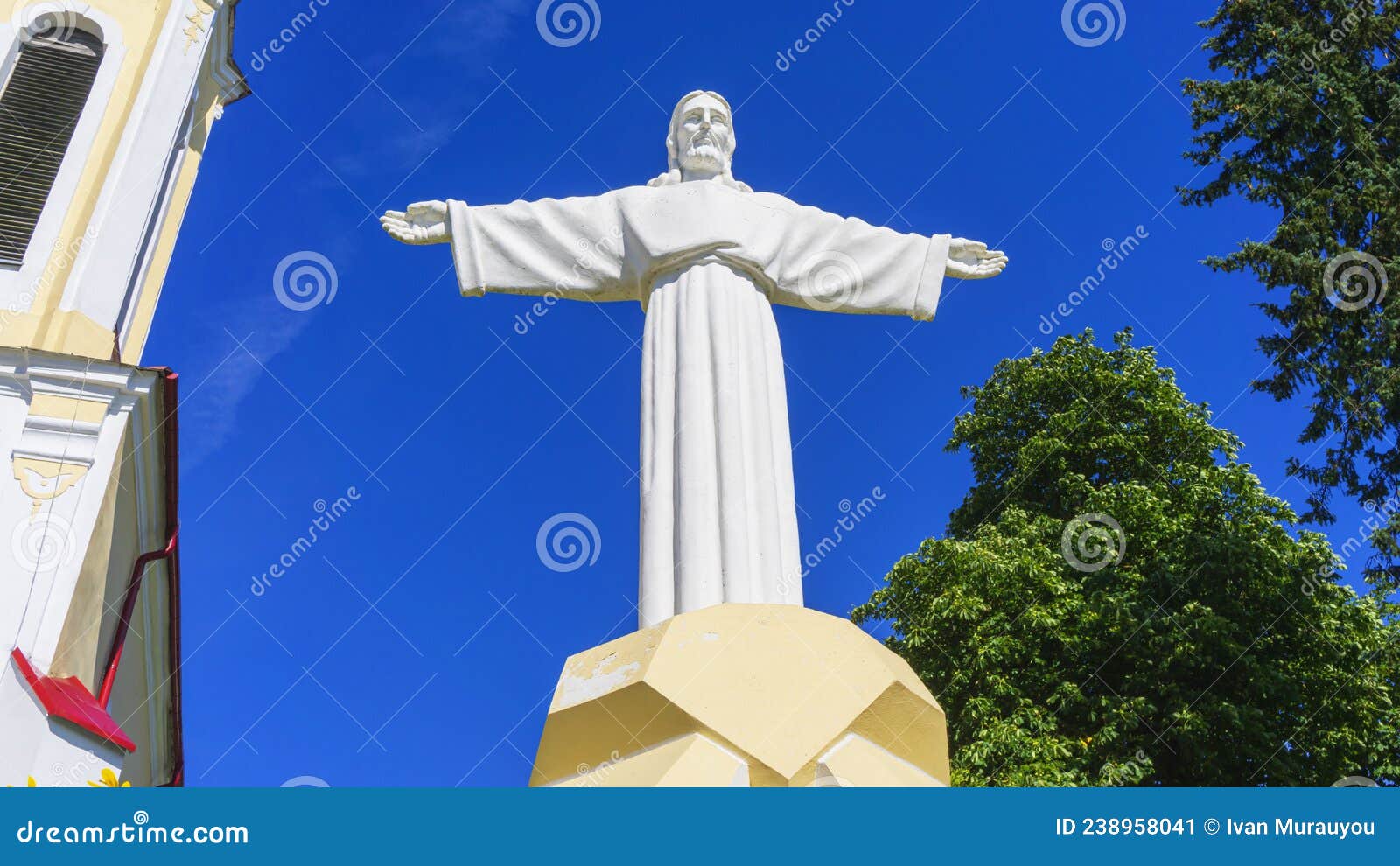 The Copy of the Sculpture of Christ the Savior Spread His Arms on Blue ...