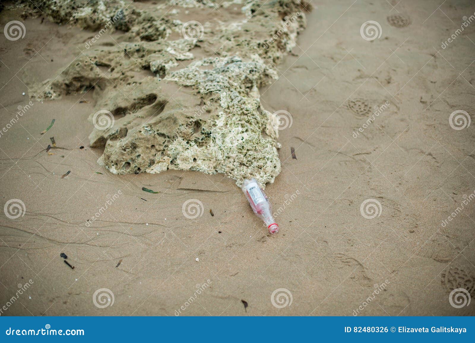 Copy Space of Empty Garbage Bottles on Sand Beach Texture Background ...