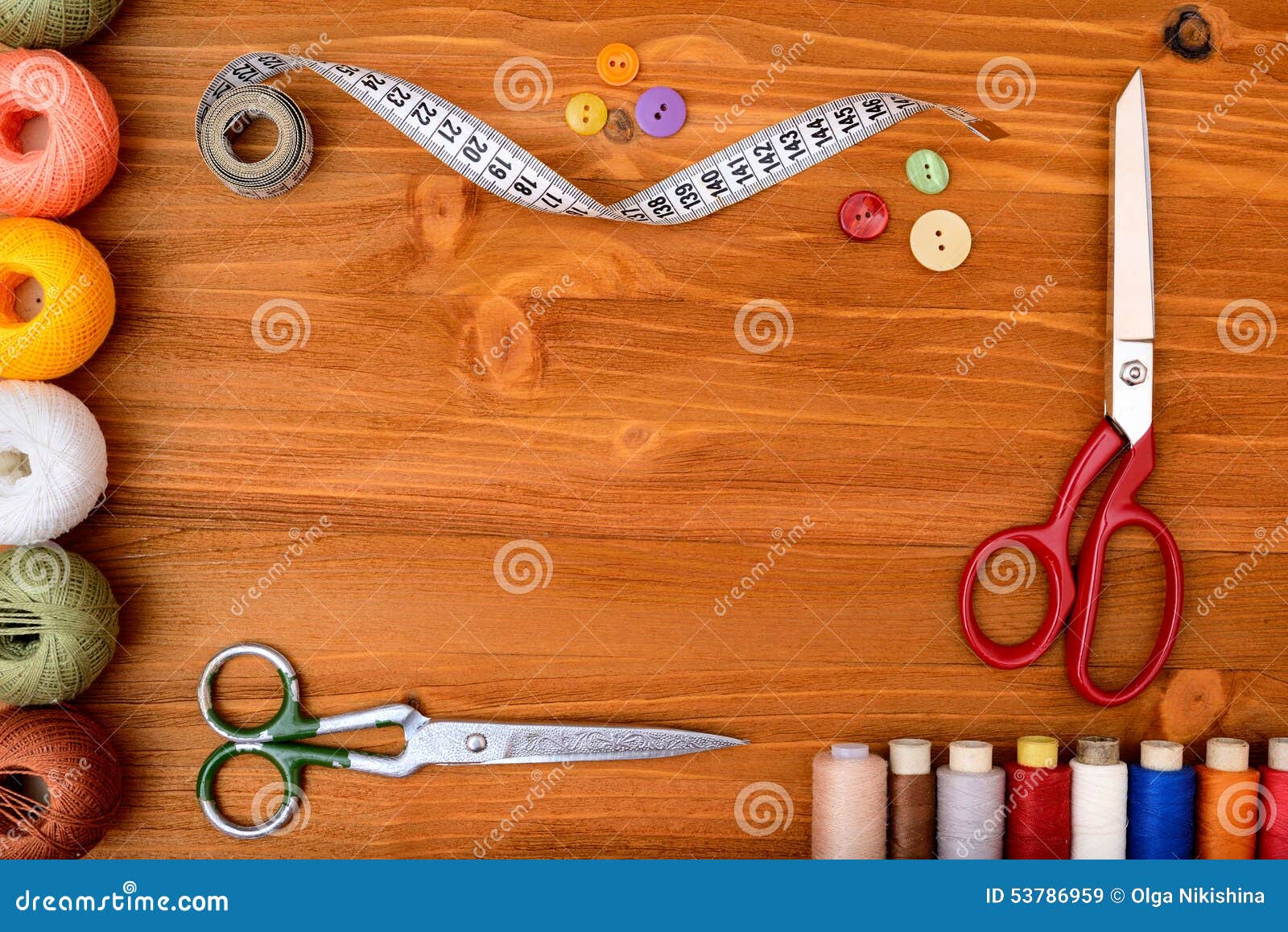 Copyspace Frame with Sewing Tools and Accesories on Wooden Background ...