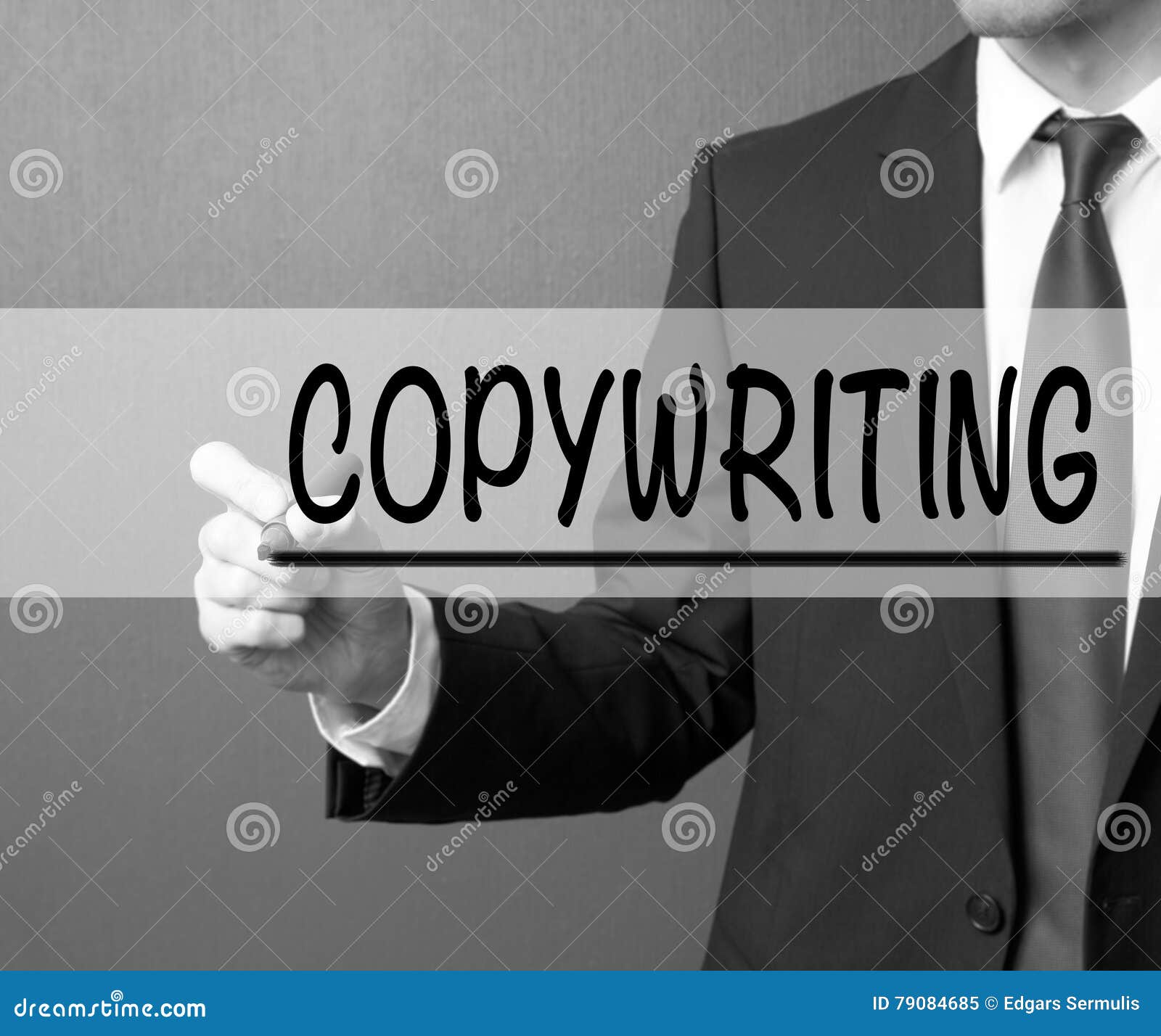 Copywriting. Businessman in a Suit with a Marker Writing on Visual ...
