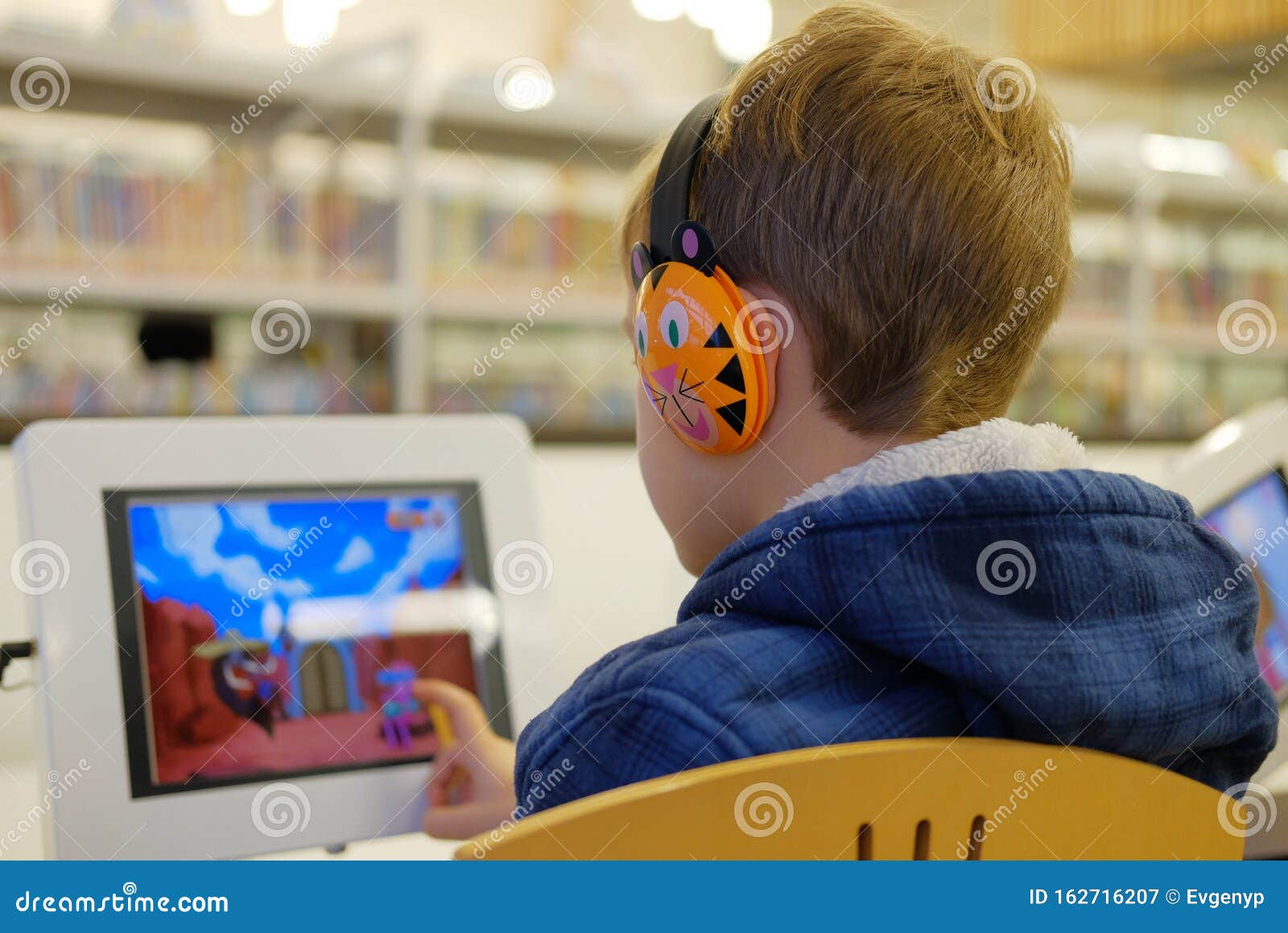 Coquitlam, Canada - December 17, 2018: Elementary School Boy in Library ...