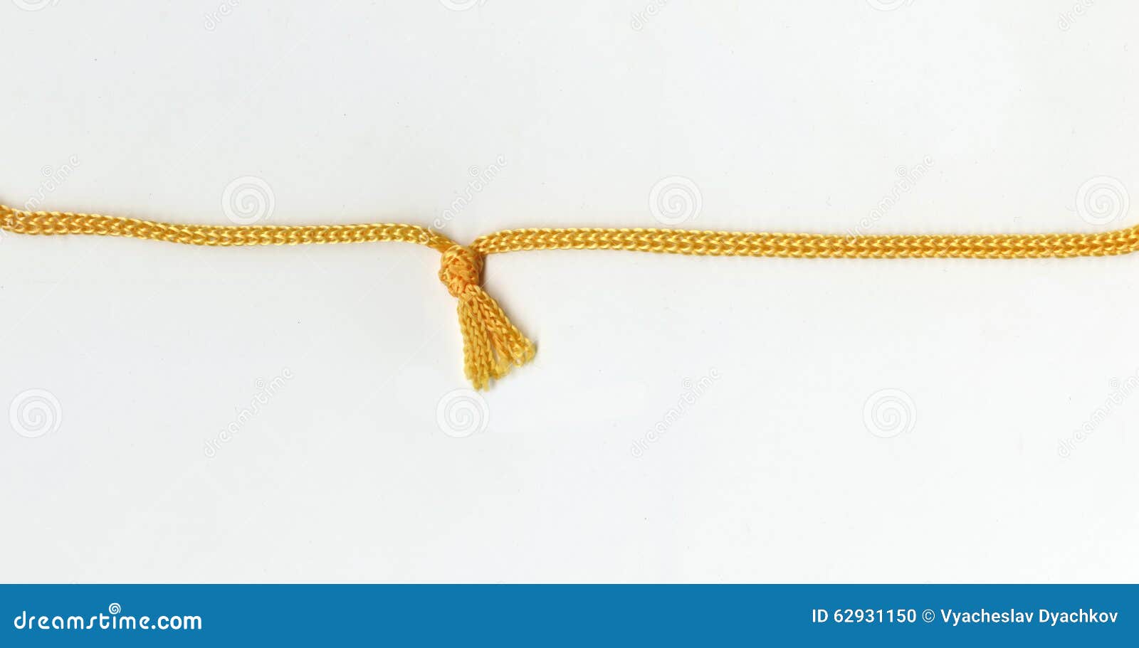 Corde jaune avec un noeud photo stock. Image du corde - 62931150