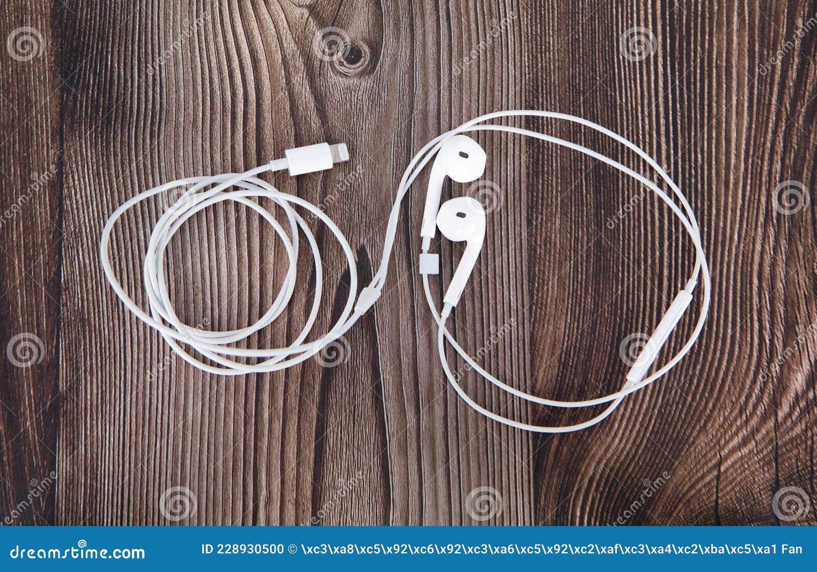 Corded Headphones on the Table Stock Photo - Image of table, earphones ...