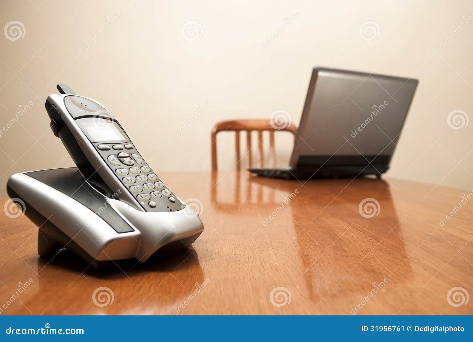 Cordless Phone and Laptop on Table Stock Image - Image of telephone ...