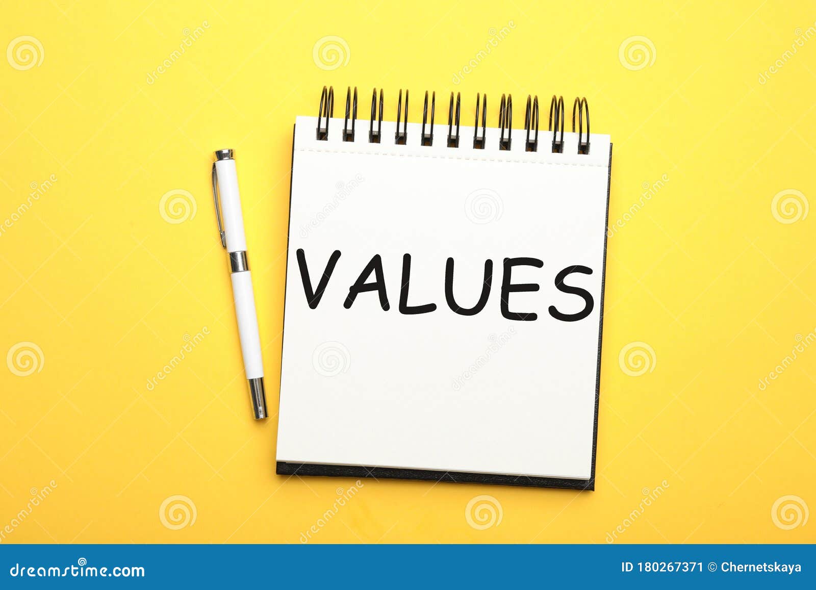 Core Values. Stylish Open Notebook and Pen on Yellow Background, Top ...