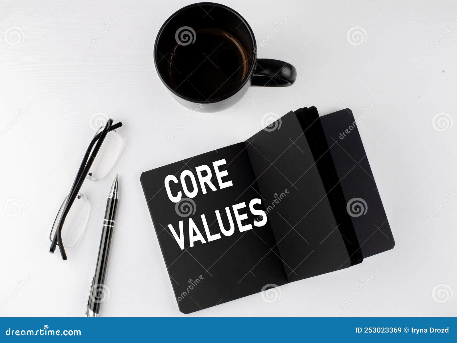 CORE VALUES Written Text in Small Black Notebook with Coffee , Pen and ...