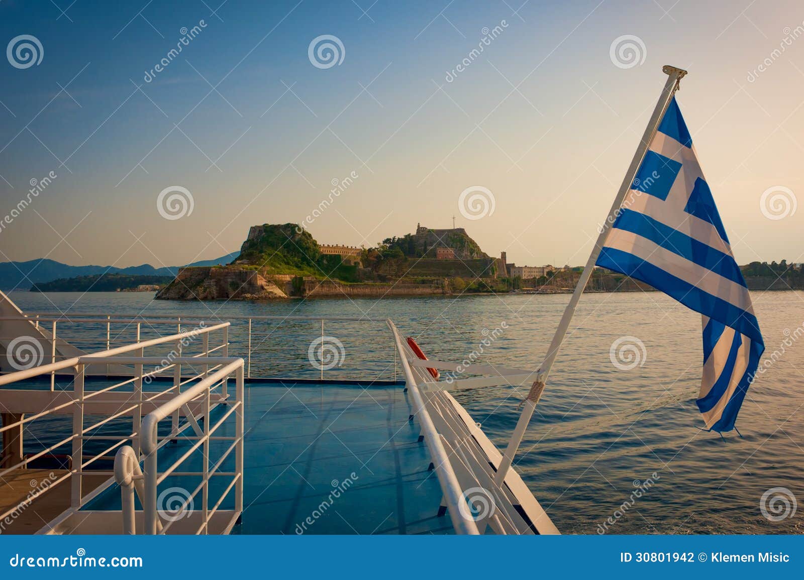 Corfu Castle And Greek Flag Pictured In Sunset From A Boat Stock Photo ...