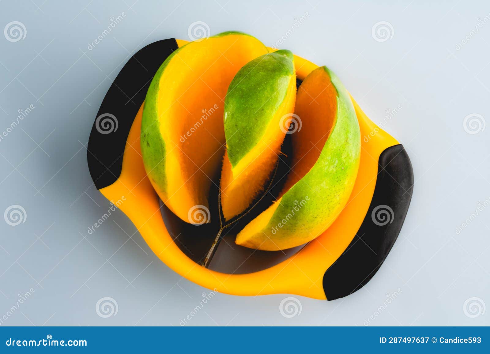 Coring a Fresh Mango with a Mango Corer Stock Image - Image of cooking ...