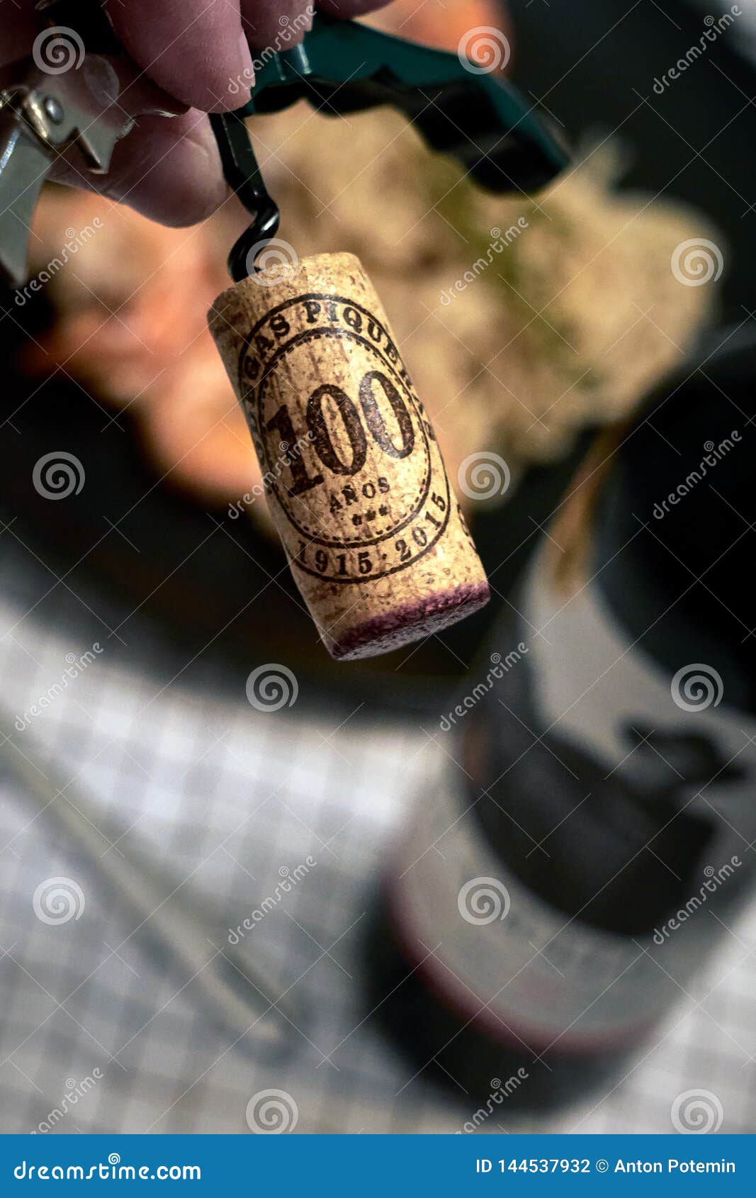 Cork Screwed from the Bottle of Red Wine Editorial Photography - Image ...
