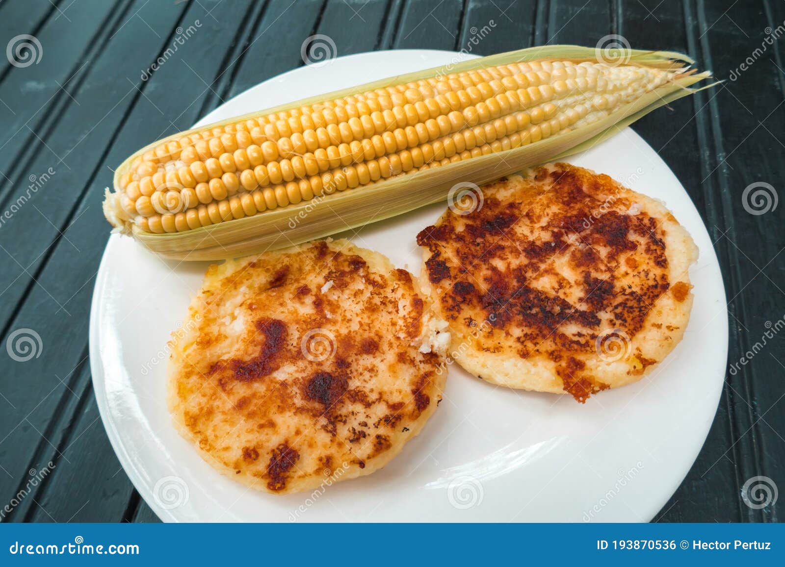 Corn Arepas Next To An Ear Of Corn Stock Photo | CartoonDealer.com ...