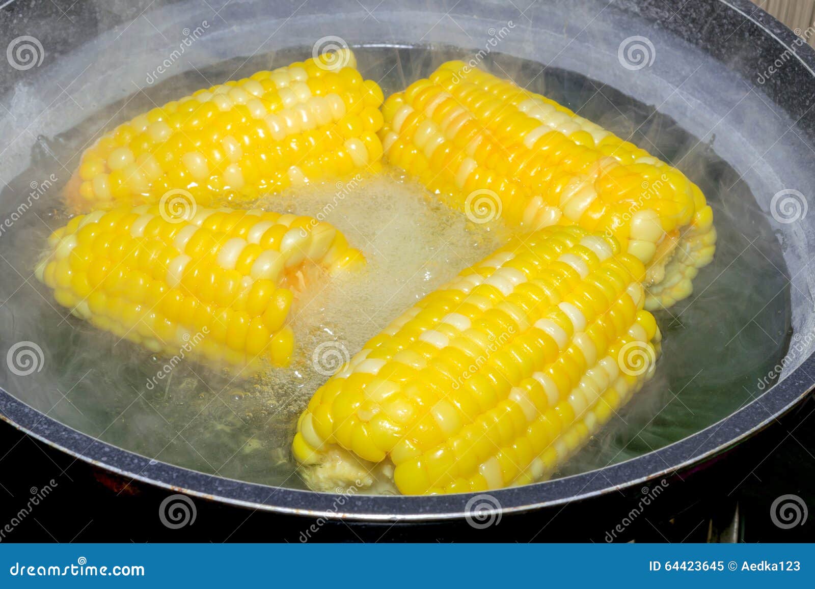 Corn boiling in pot stock image. Image of detail, drumstick - 64423645