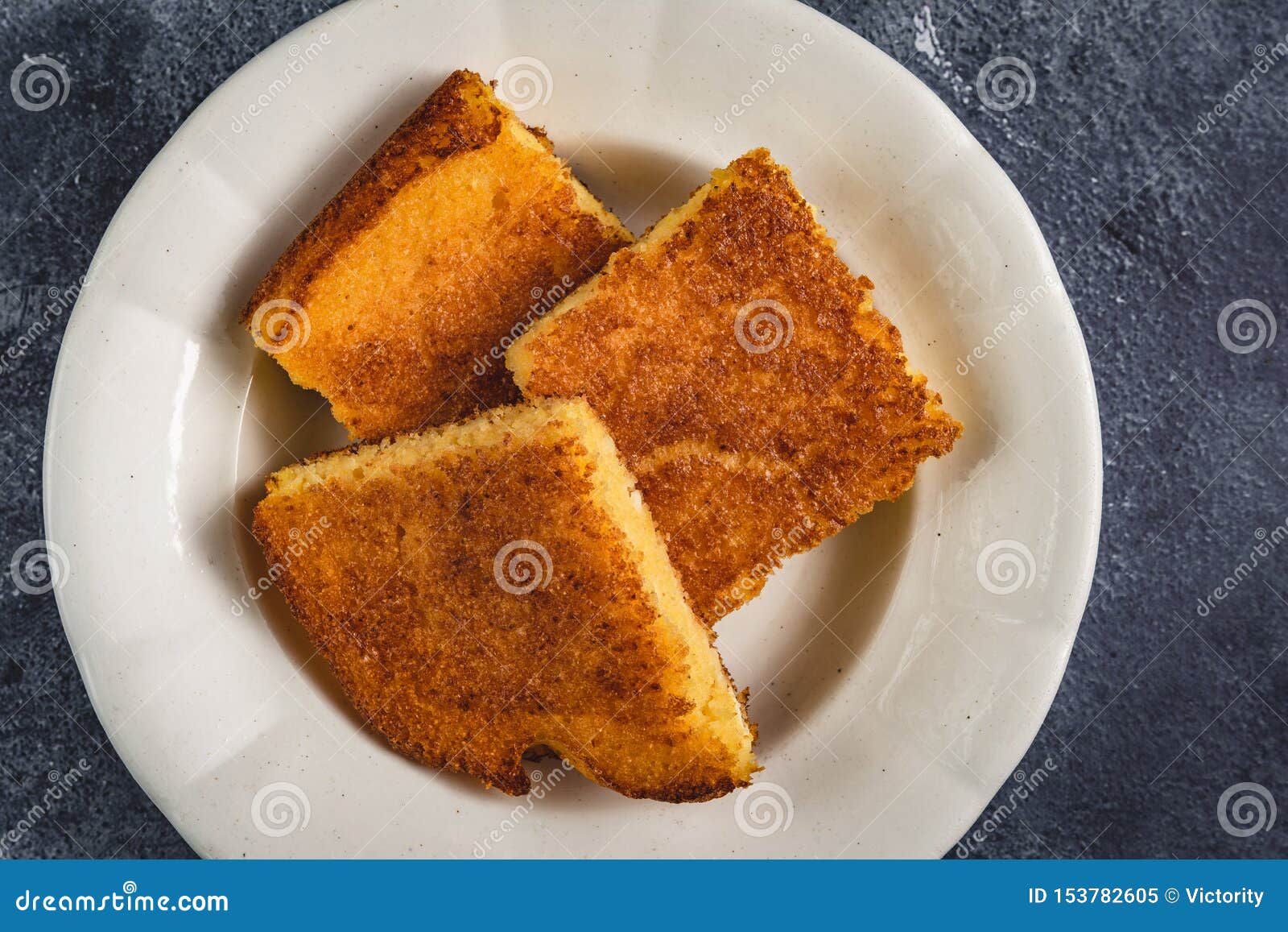 Corn Bread Squares Slices on Dark Rustic Background Stock Image - Image ...