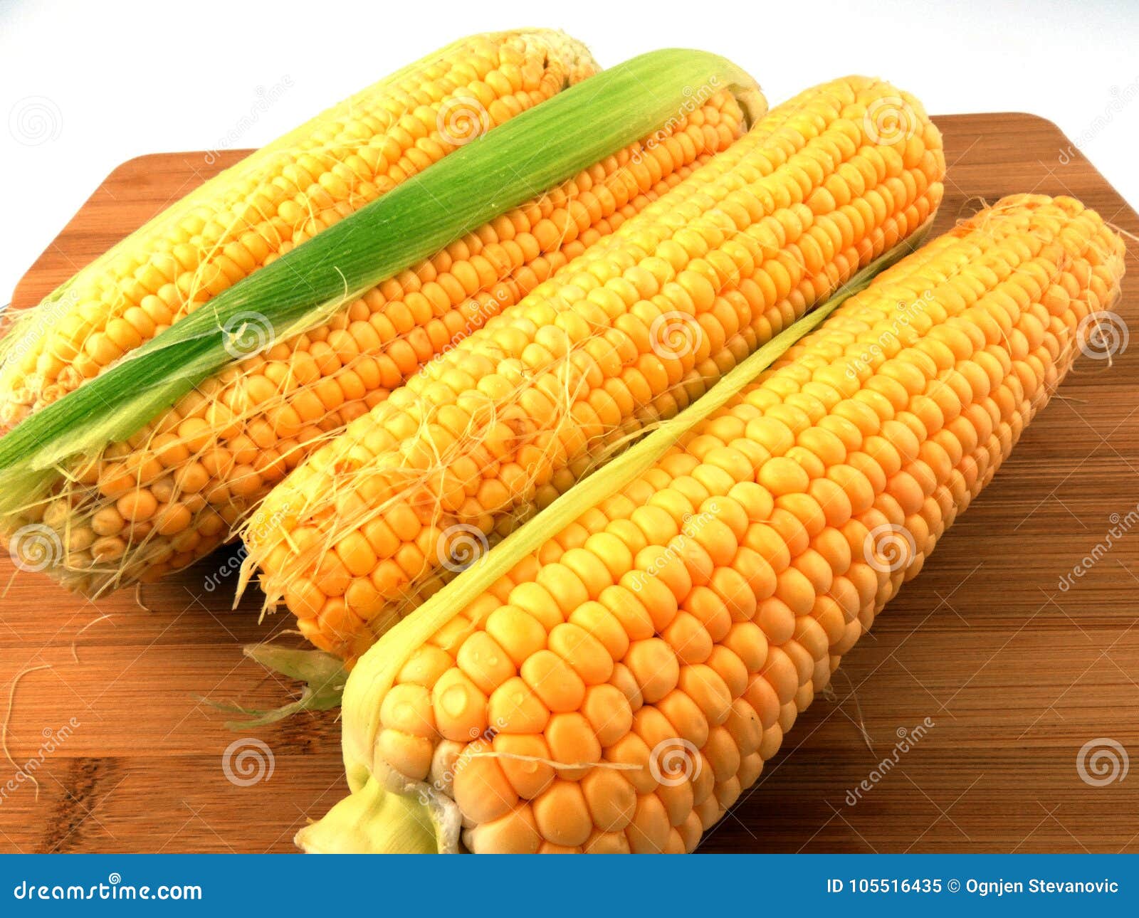 Corn Cob on Wooden Plank Isolated on White Stock Image - Image of plate ...
