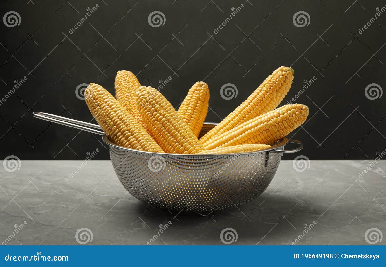Corn Cobs in Colander on Grey Marble Table Stock Photo - Image of crop ...