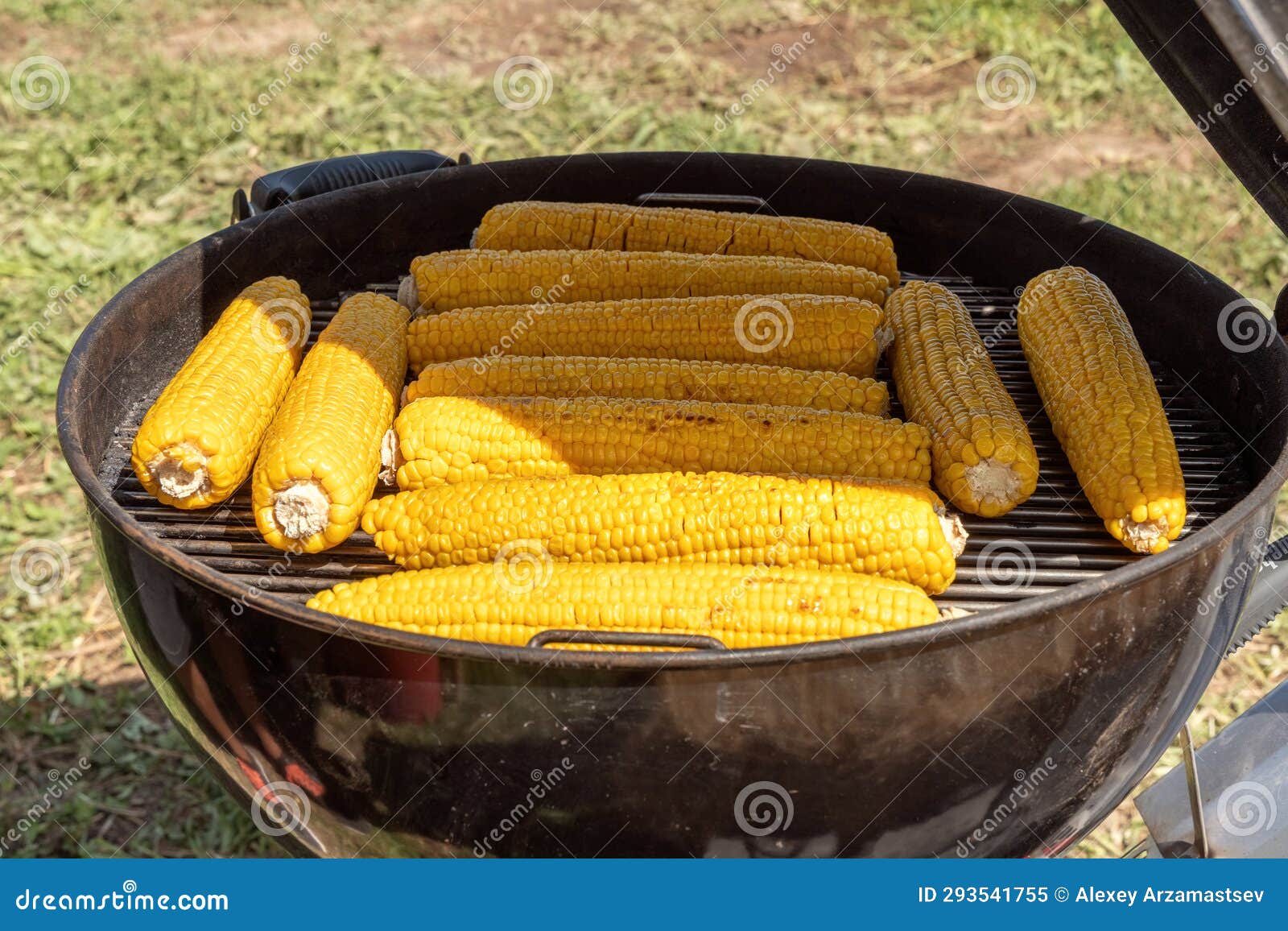 Corn Cobs are Cooked on the Grill Grate. BBQ Outdoors Stock Image ...