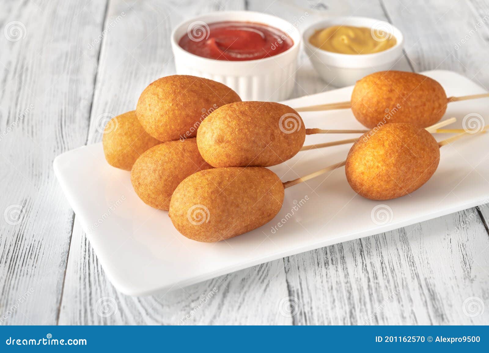 Corn Dogs on White Serving Plate Stock Photo - Image of corndog, plate ...