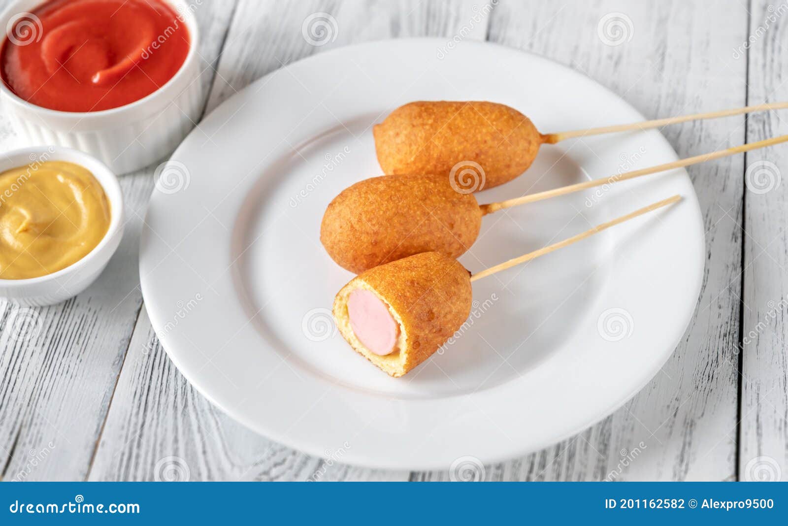 Corn Dogs on White Serving Plate Stock Photo - Image of corndog, group ...