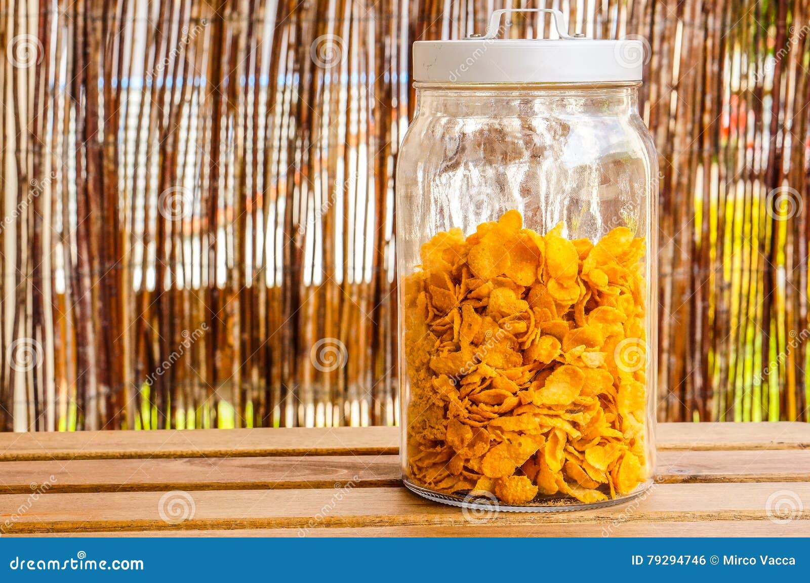 Corn flakes in container stock photo. Image of corn, wooden - 79294746