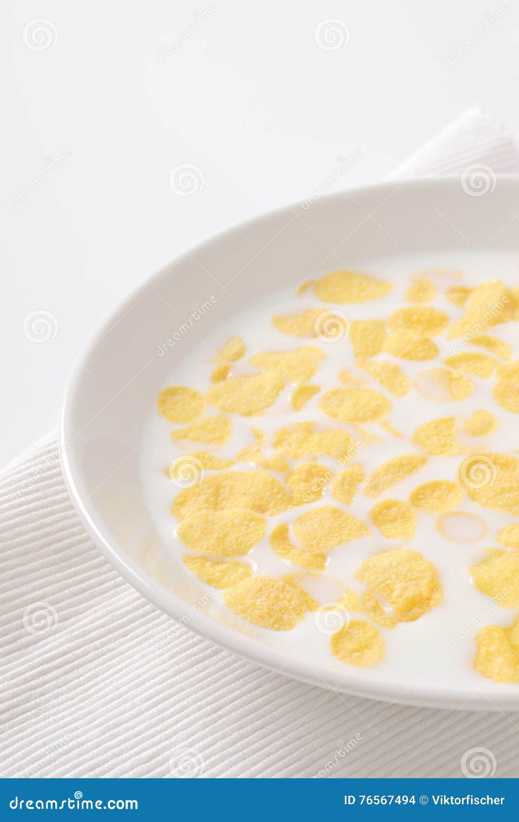 Corn flakes with milk stock photo. Image of tasty, plate - 76567494