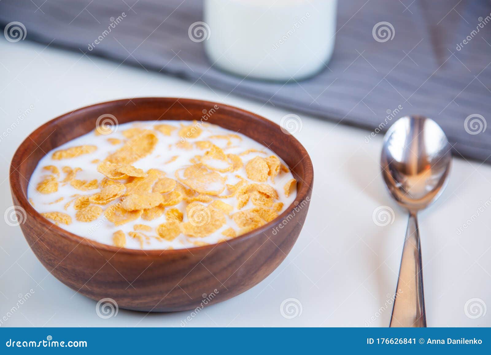 Corn Flakes with Milk in a Wooden Plate on the Table Stock Image ...