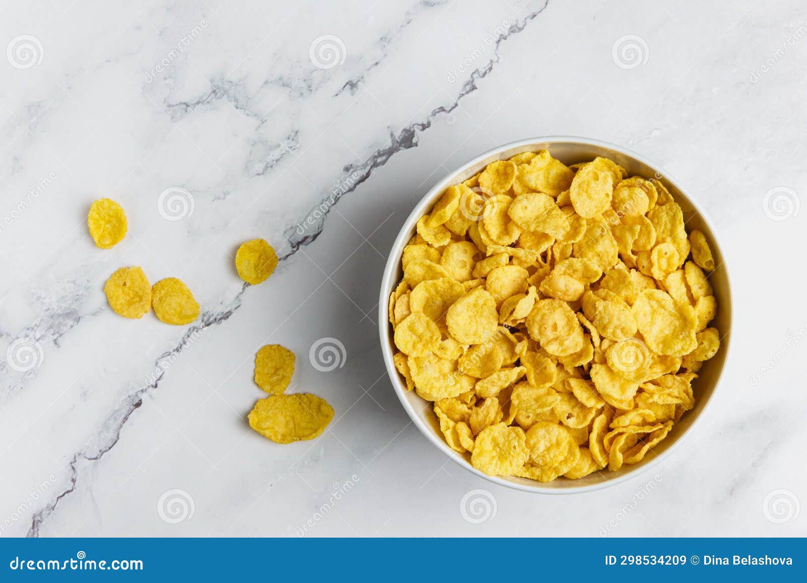 Corn Flakes in White Bowl on Marble Table Stock Image - Image of snack ...