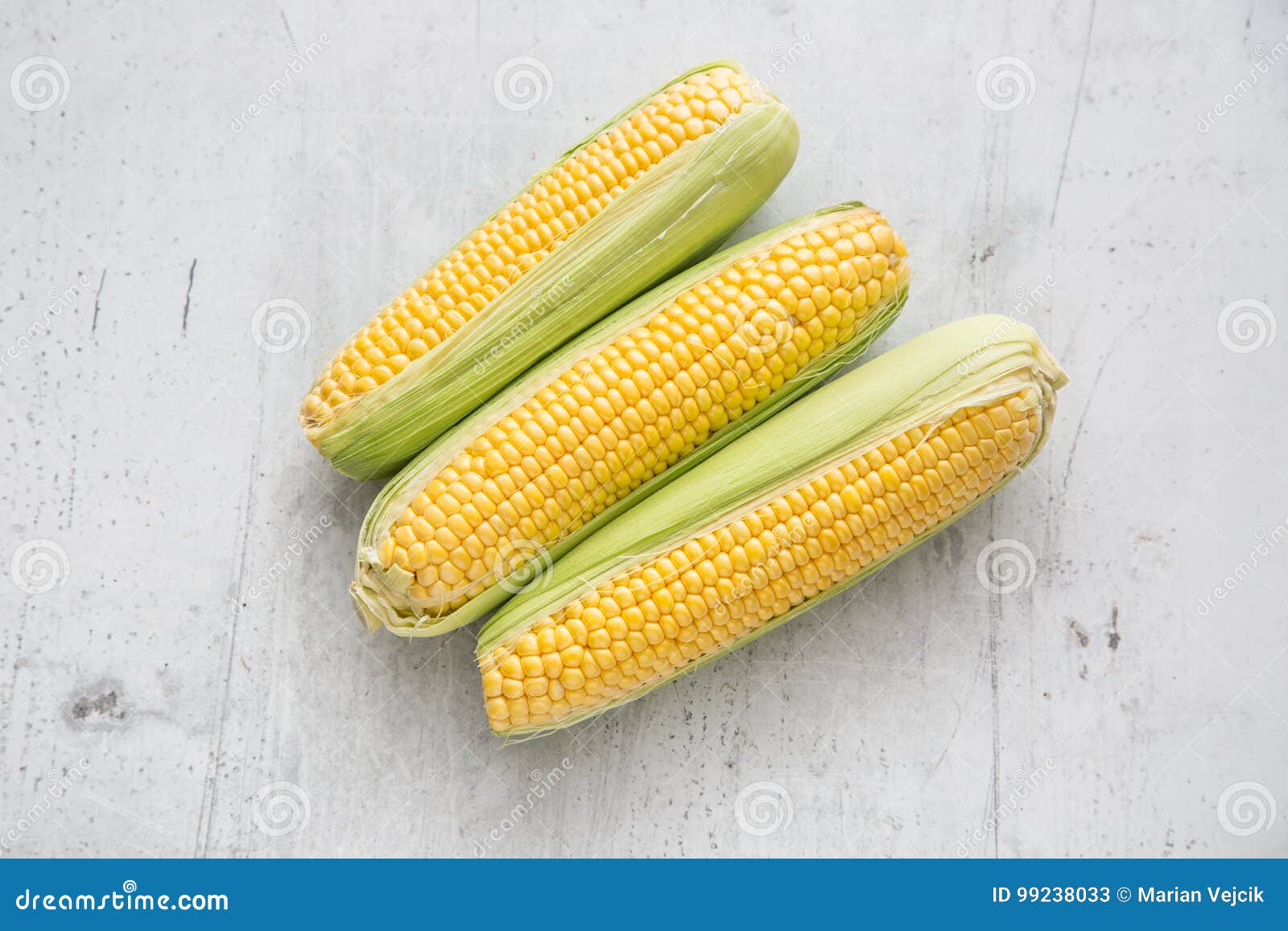 Corn. Fresh Corn on White Concrete Board Stock Image - Image of rustic ...