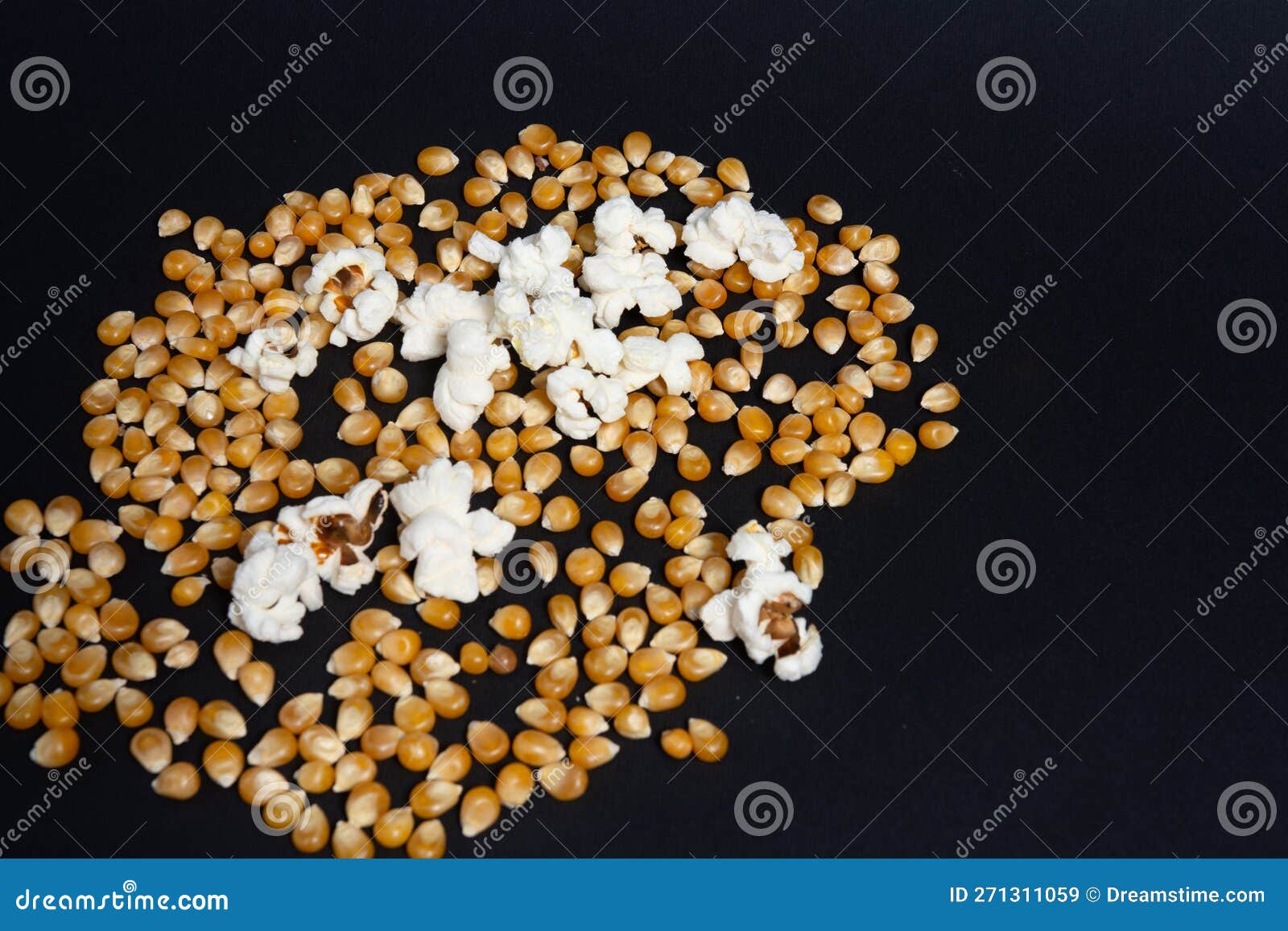 Corn Kernels for Making Popcorn and Several Pieces of Ready Popcorn ...