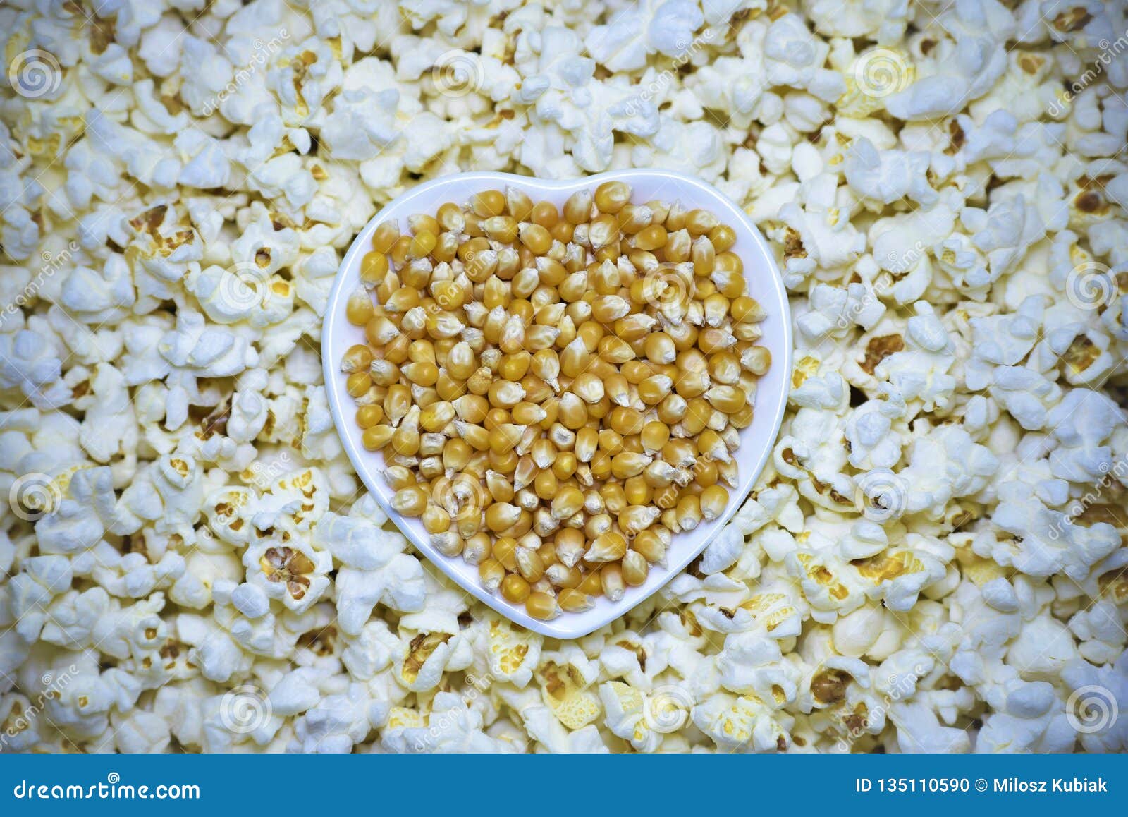 Corn kernels and popcorn stock photo. Image of background - 135110590