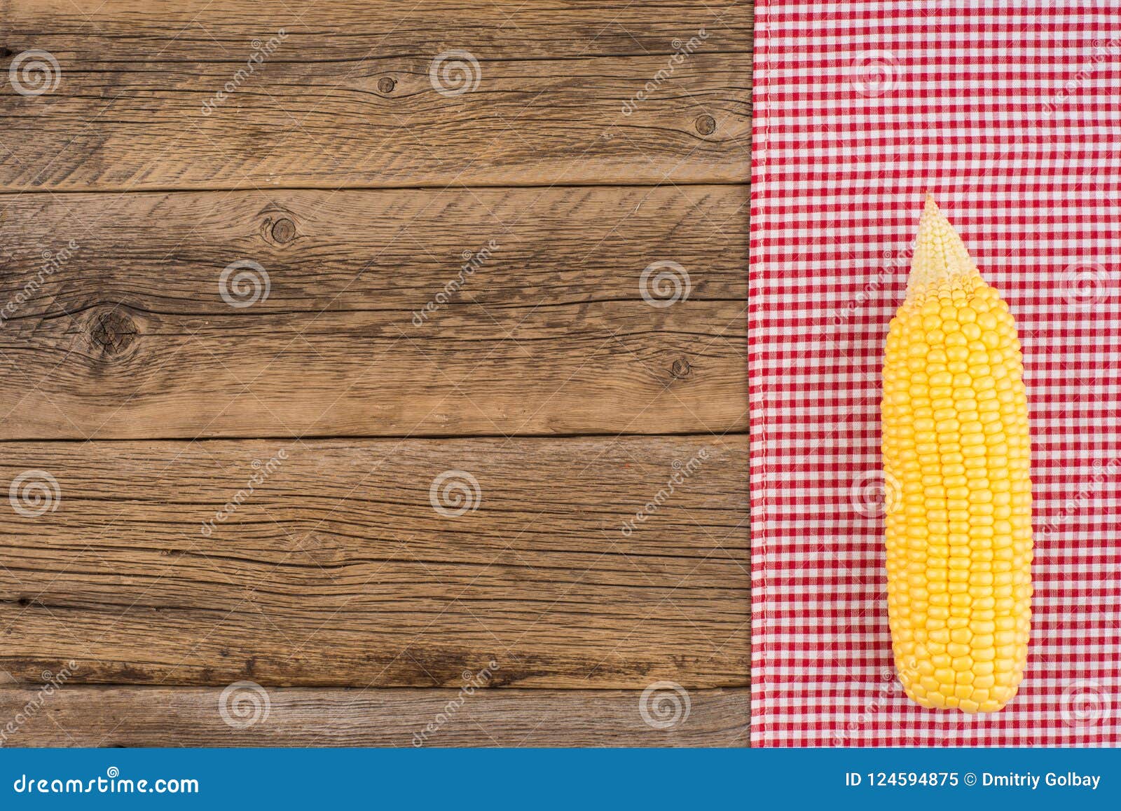 Corn on a Kitchen Napkin and Wooden Table. Stock Image - Image of green ...