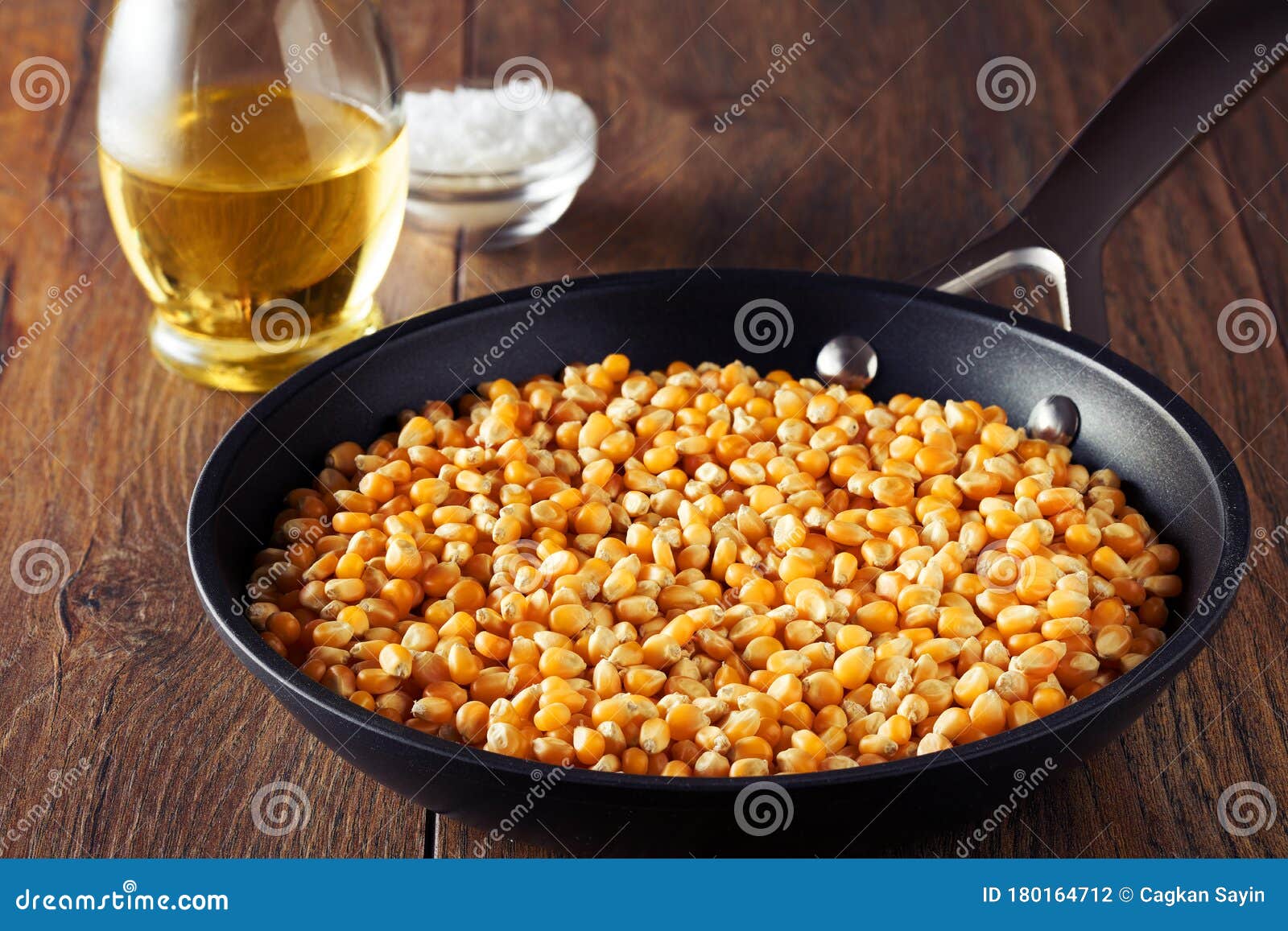 Corn Maize or Kernel Seed in a Frying Pan on a Wooden Kitchen Table ...