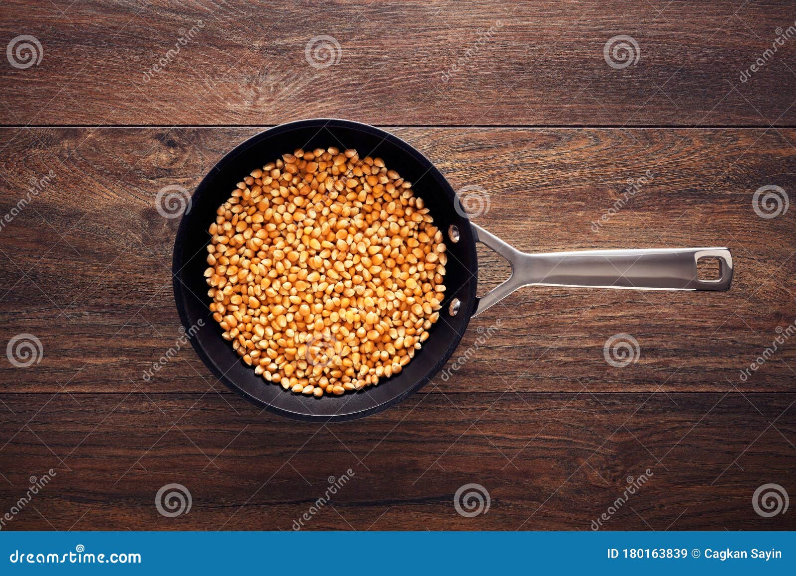 Corn Maize or Kernel Seed in a Frying Pan on a Wooden Kitchen Table ...