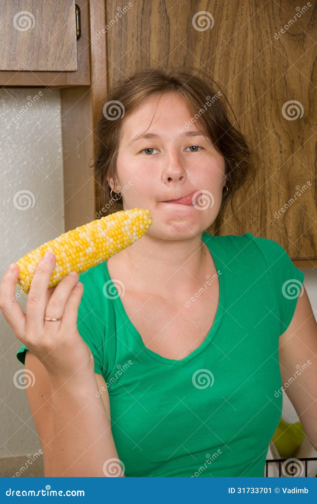 Corn stock image. Image of hair, brunette, eating, female - 31733701