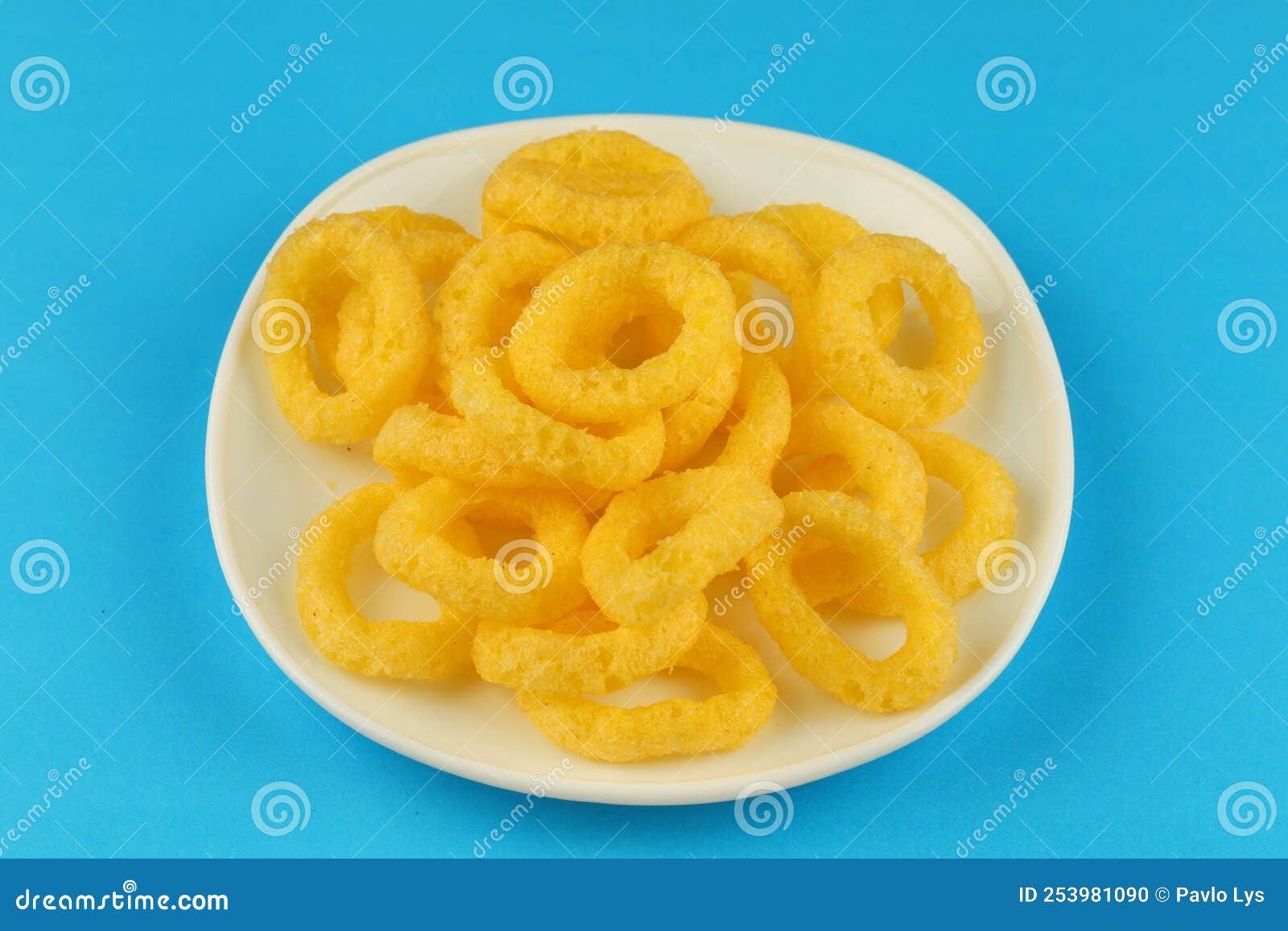 Corn Rings. Yellow Snacks in a Plate Stock Photo - Image of product ...
