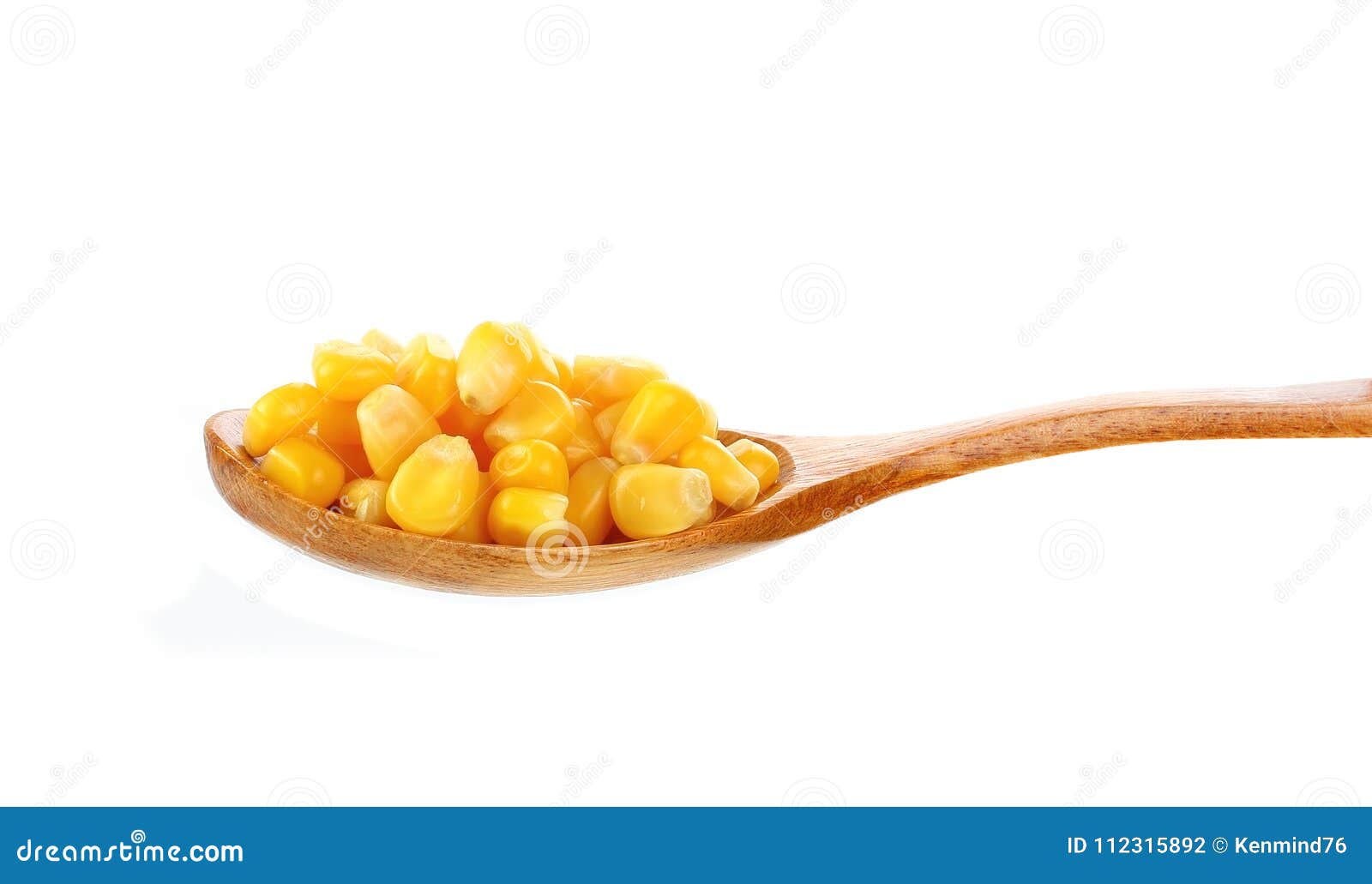 Corn in spoon on table stock photo. Image of health - 112315892