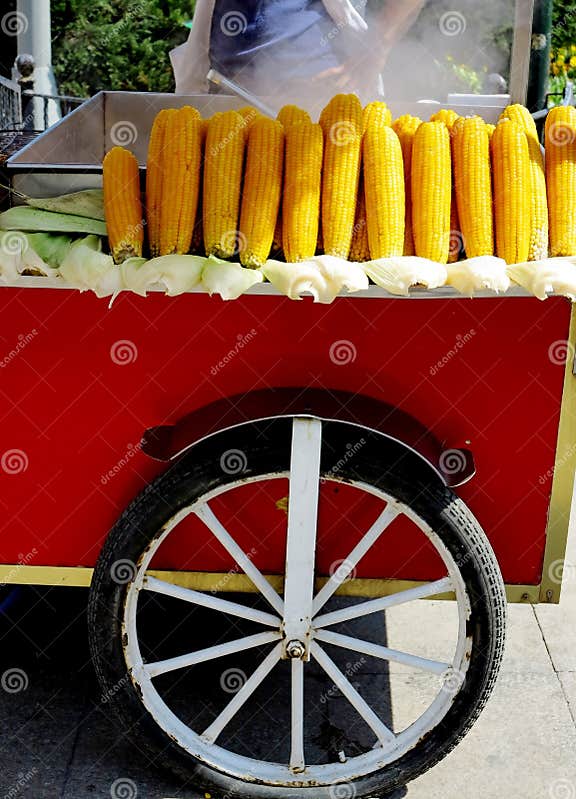 Corn on wheels stock photo. Image of sale, barbecue, middle - 30680514