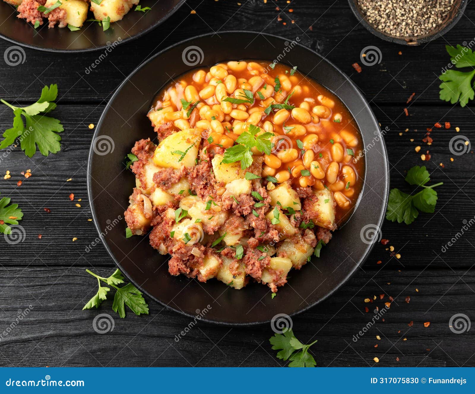 Corned Beef Hash with Potatoes and Beans in Tomato Sauce. Stock Photo ...