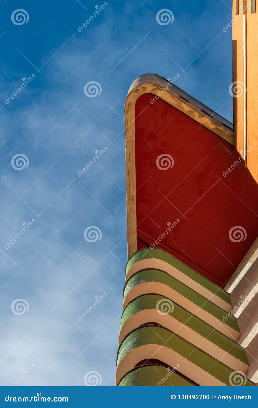 A Corner Apartment Building With Circular Round Balcony, Railings And ...