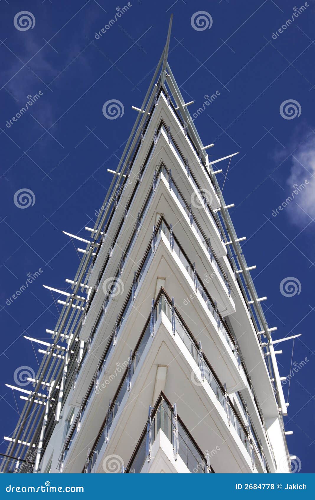 A Corner Apartment Building With Circular Round Balcony, Railings And ...