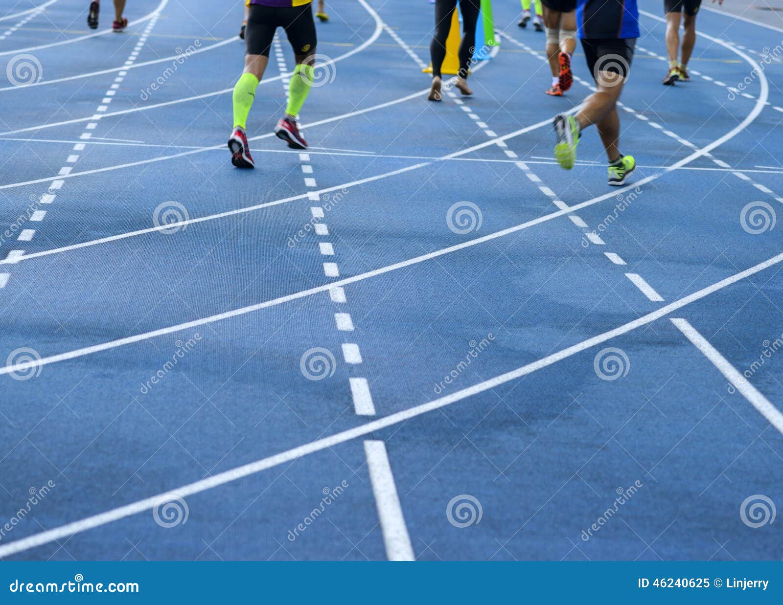 Corner of Blue Running Track Stock Image - Image of human, jogging ...