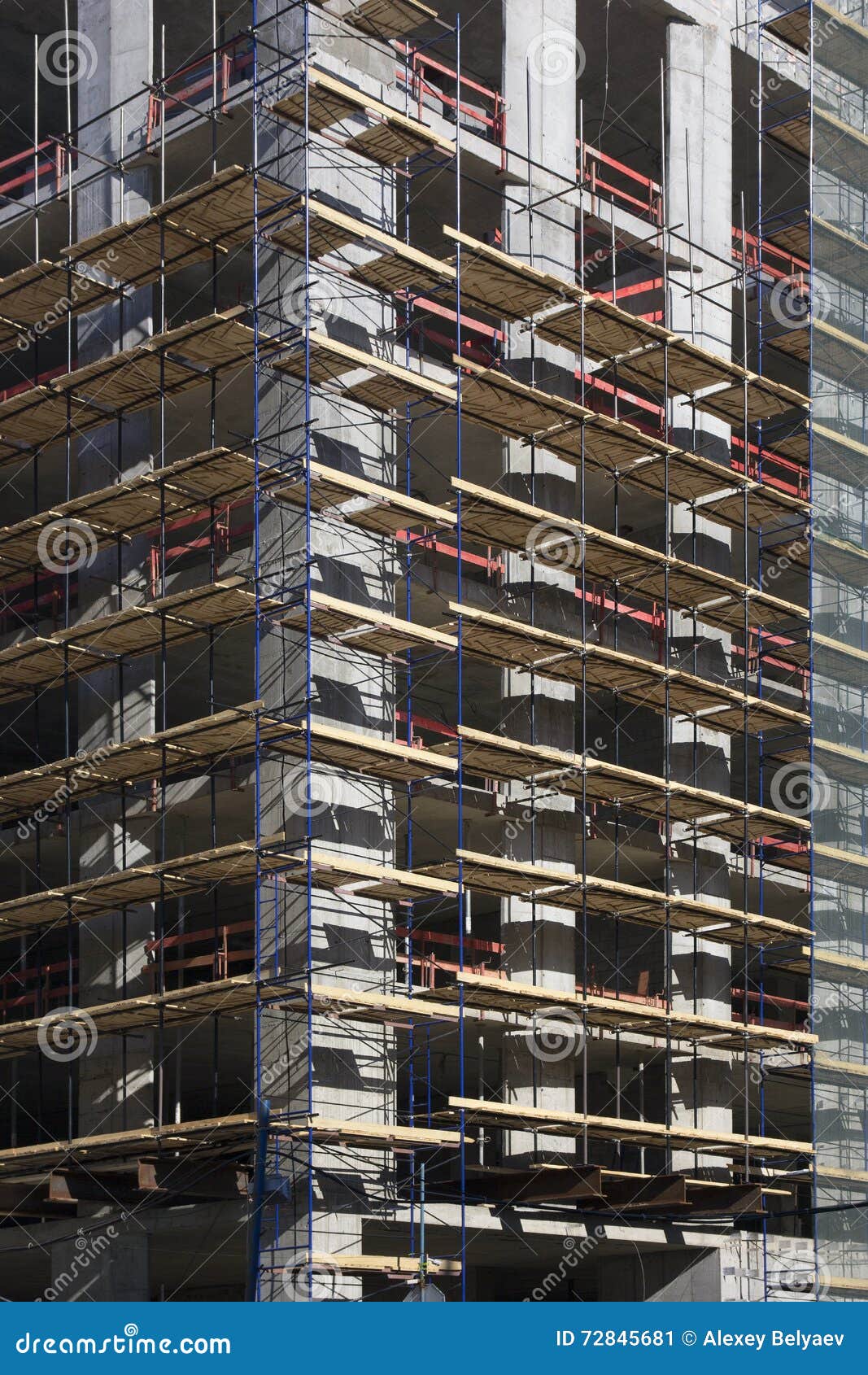 Corner of Concrete Building Under Construction with Scaffolding Stock ...