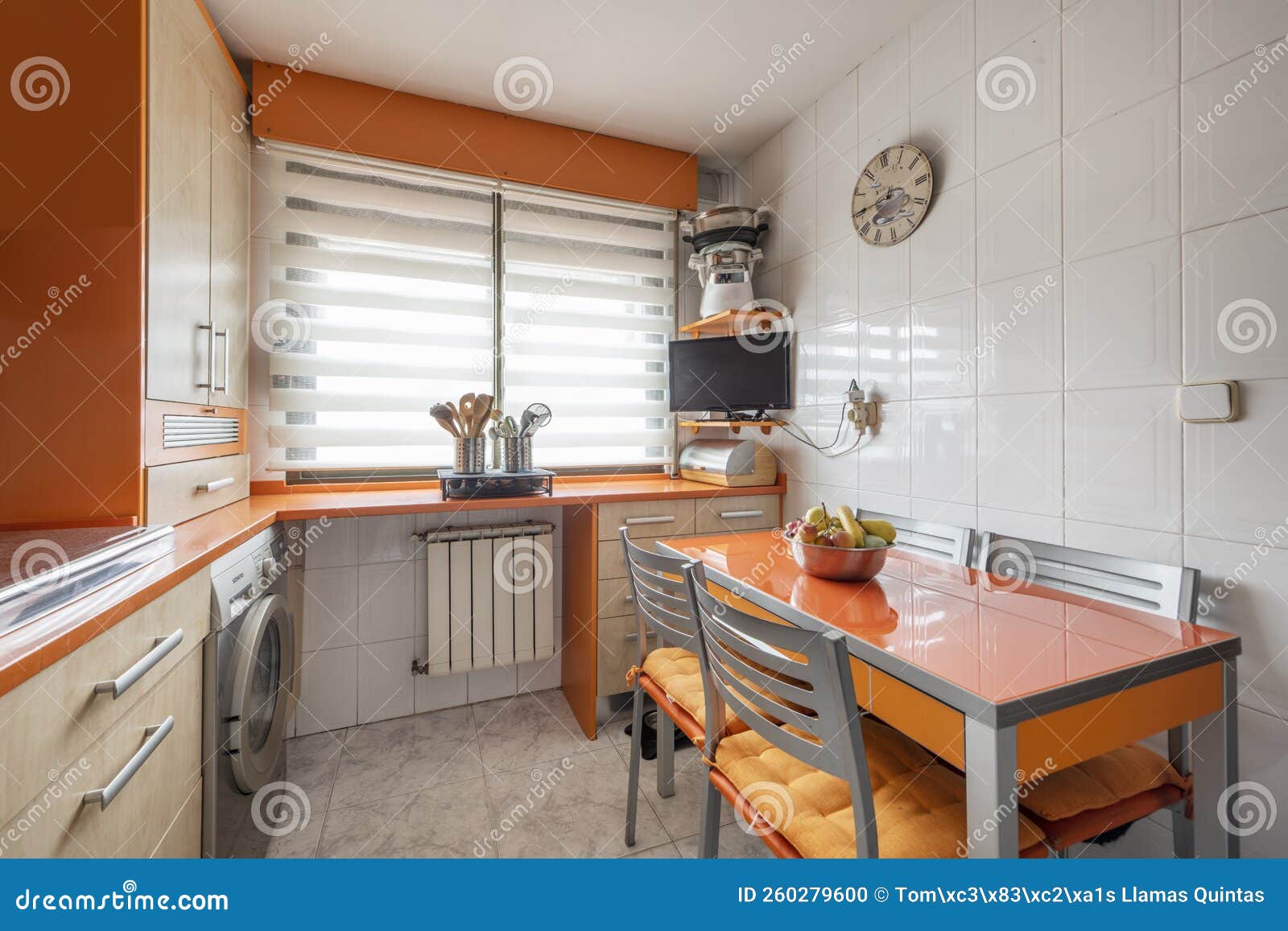 Corner of a Conventional Kitchen with Bright Orange Cabinets Combined ...