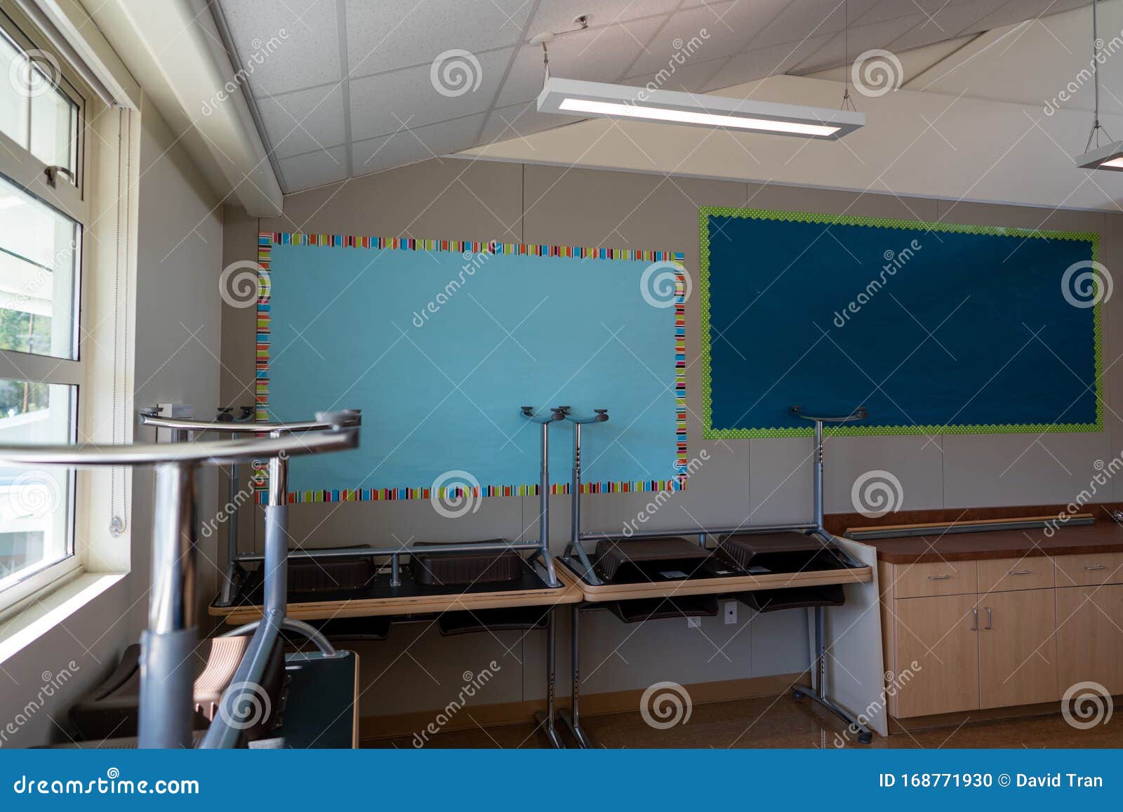 Posters At School Classroom Wall Stock Photo | CartoonDealer.com #66977604