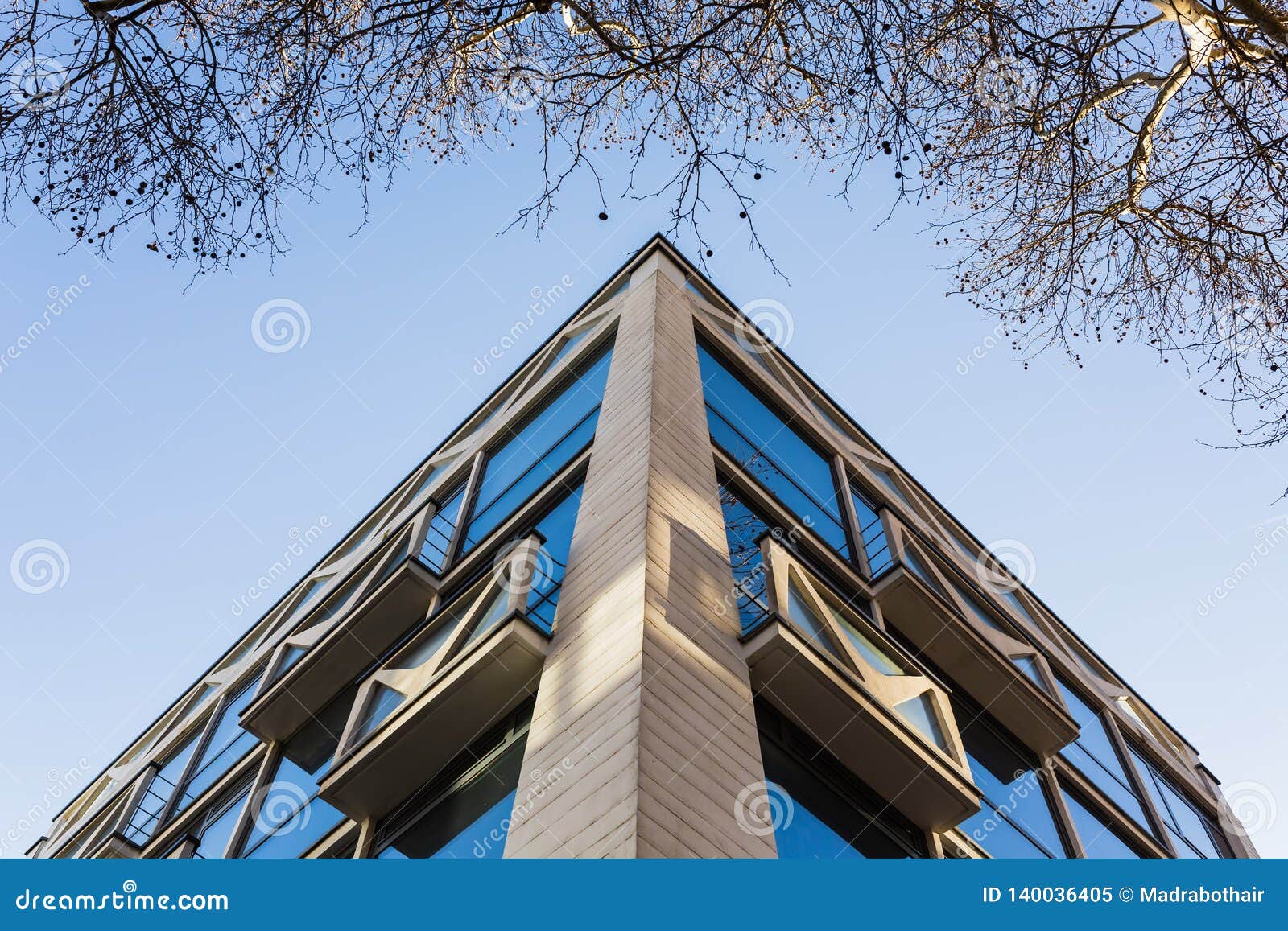 Corner of a Modern Building Stock Image - Image of tree, structure ...
