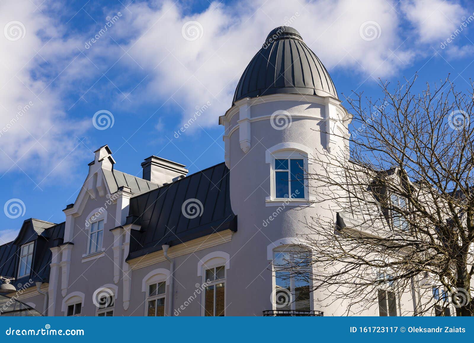 The Corner of an Old Fashioned Building with Tower and Dome Against a ...