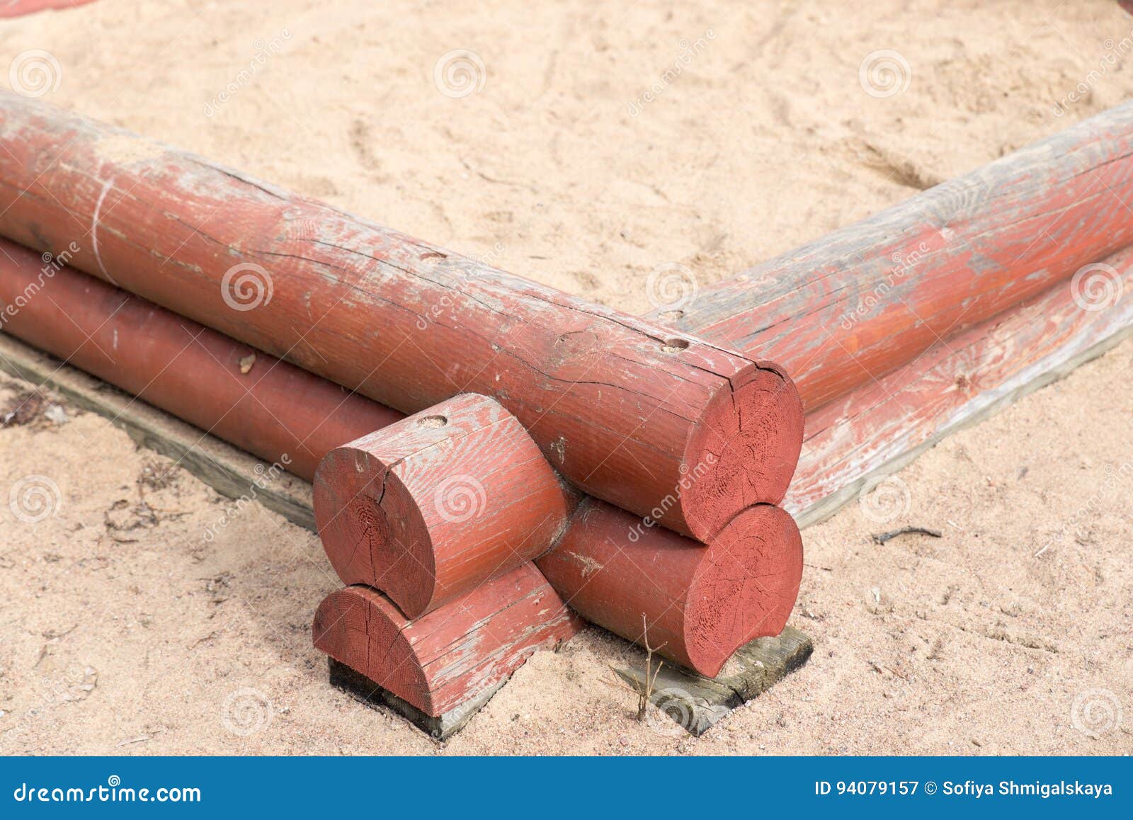 Corner of Red Logs in the Sand Stock Image - Image of barn, house: 94079157