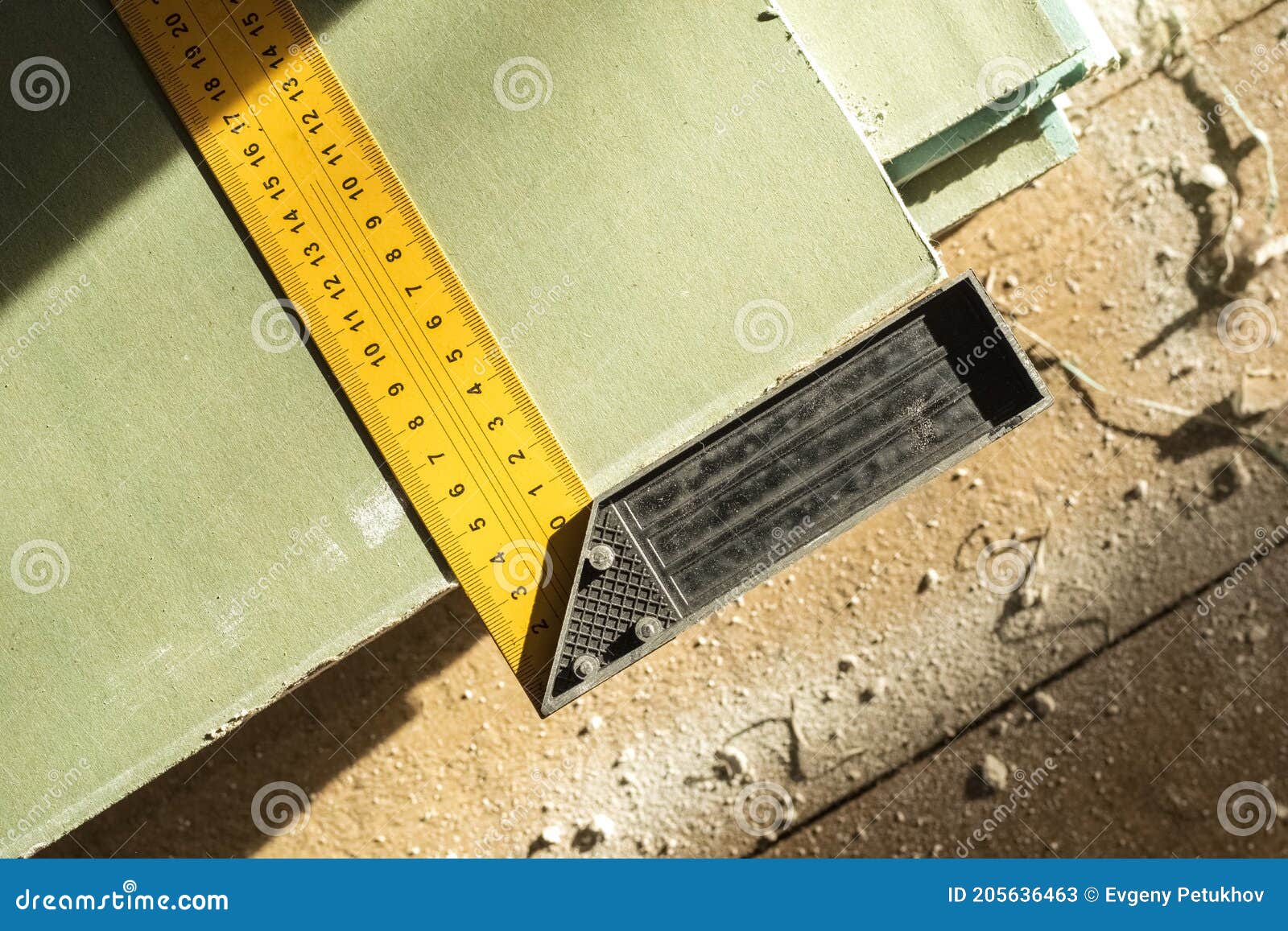 Corner Ruler on Drywall Sheets. the Stack of Gypsum Board Preparing for ...