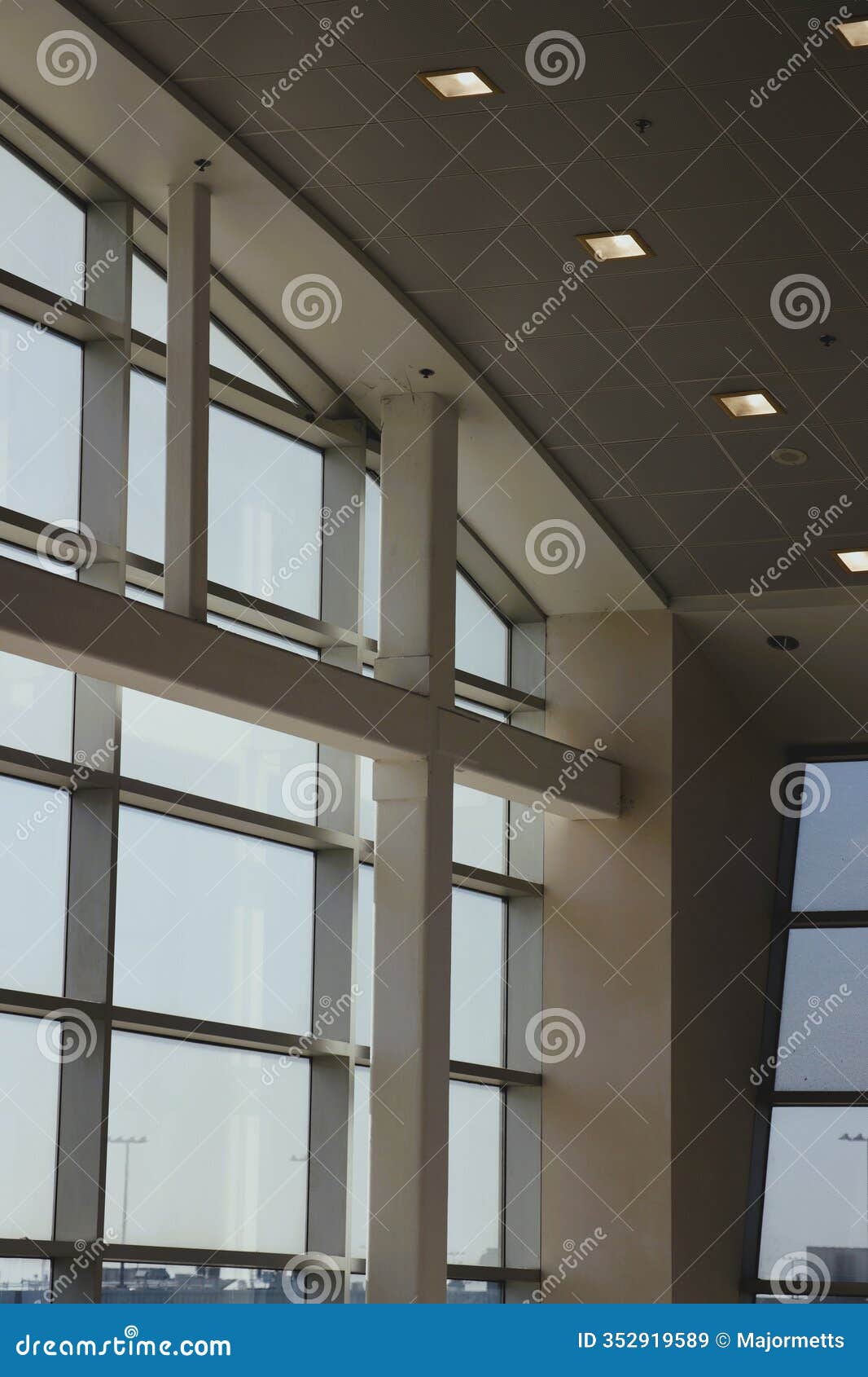 Corner of White and Gray Arched Airport Concourse Ceiling with Square ...