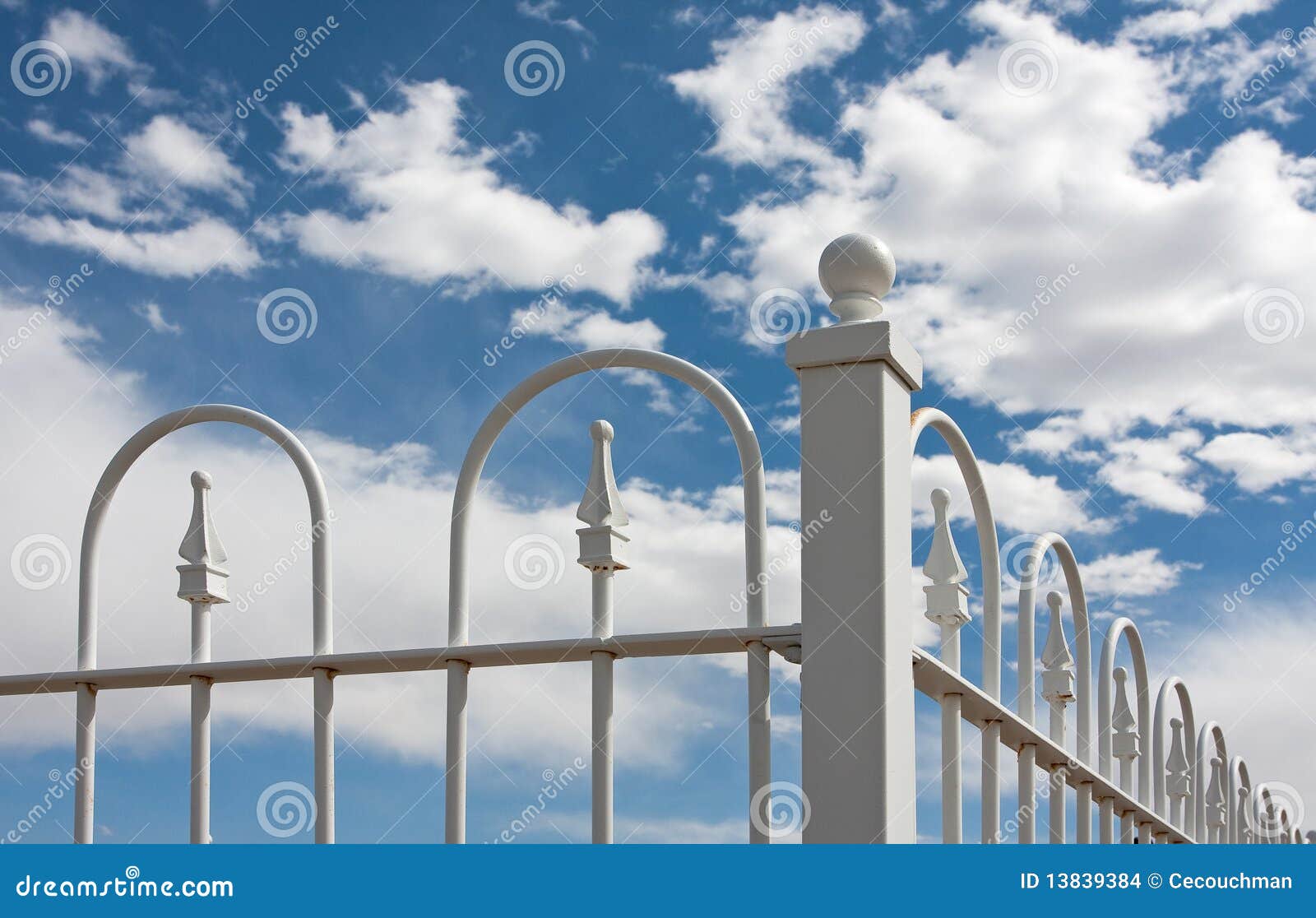 Corner of White Wrought Iron Fence Stock Photo - Image of post, clouds ...