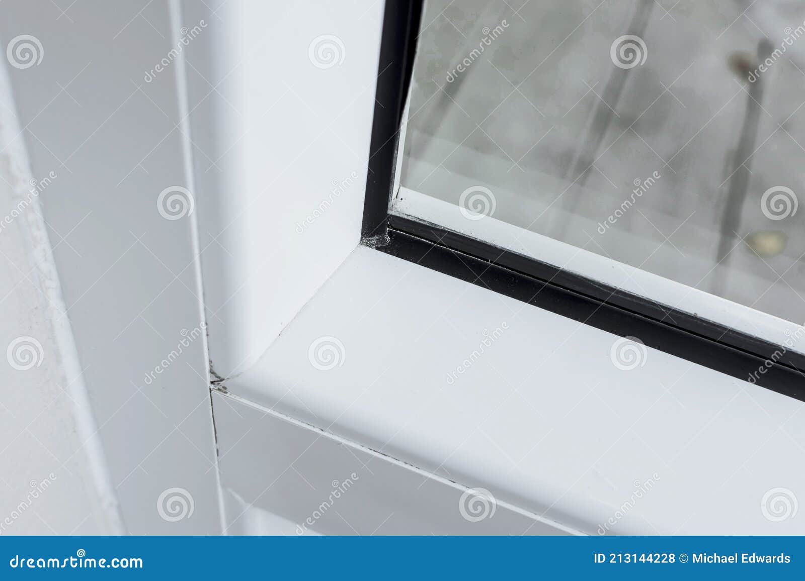 The Corner Of A Window Pvc Frame With A Rubber Gasket Or Seal Stock ...