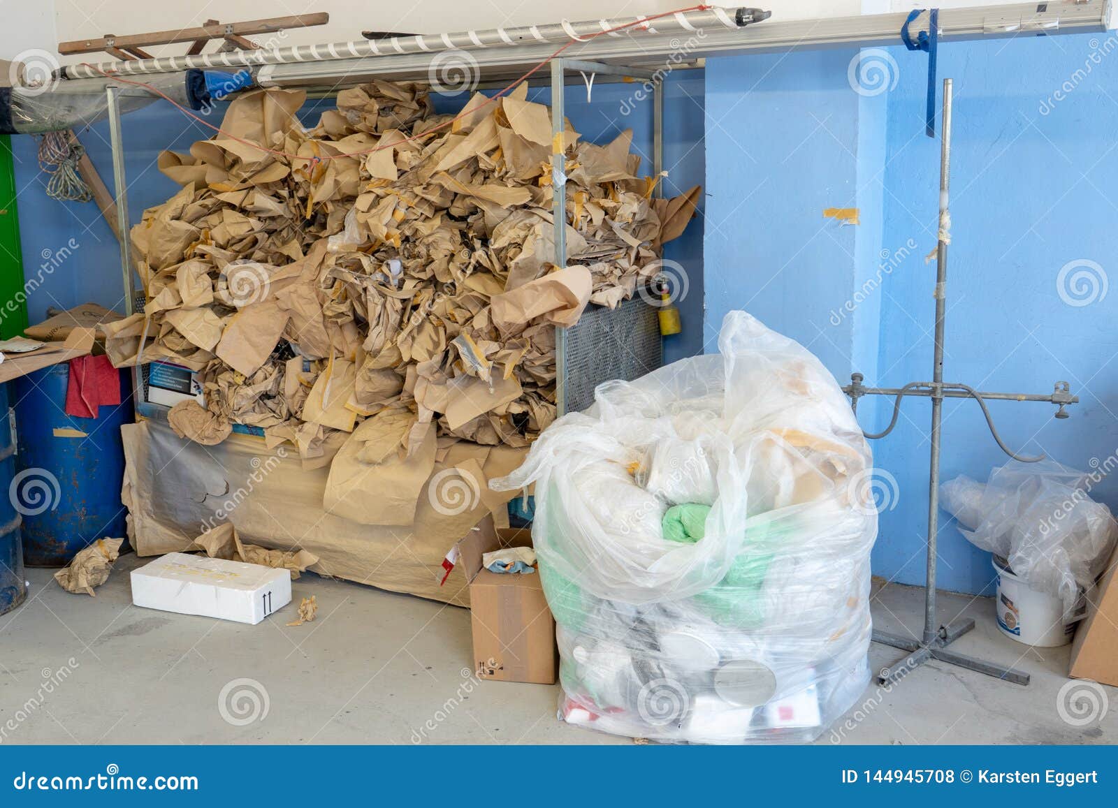 In a Corner of a Workshop, a Mountain of Garbage is Piling Up Stock ...